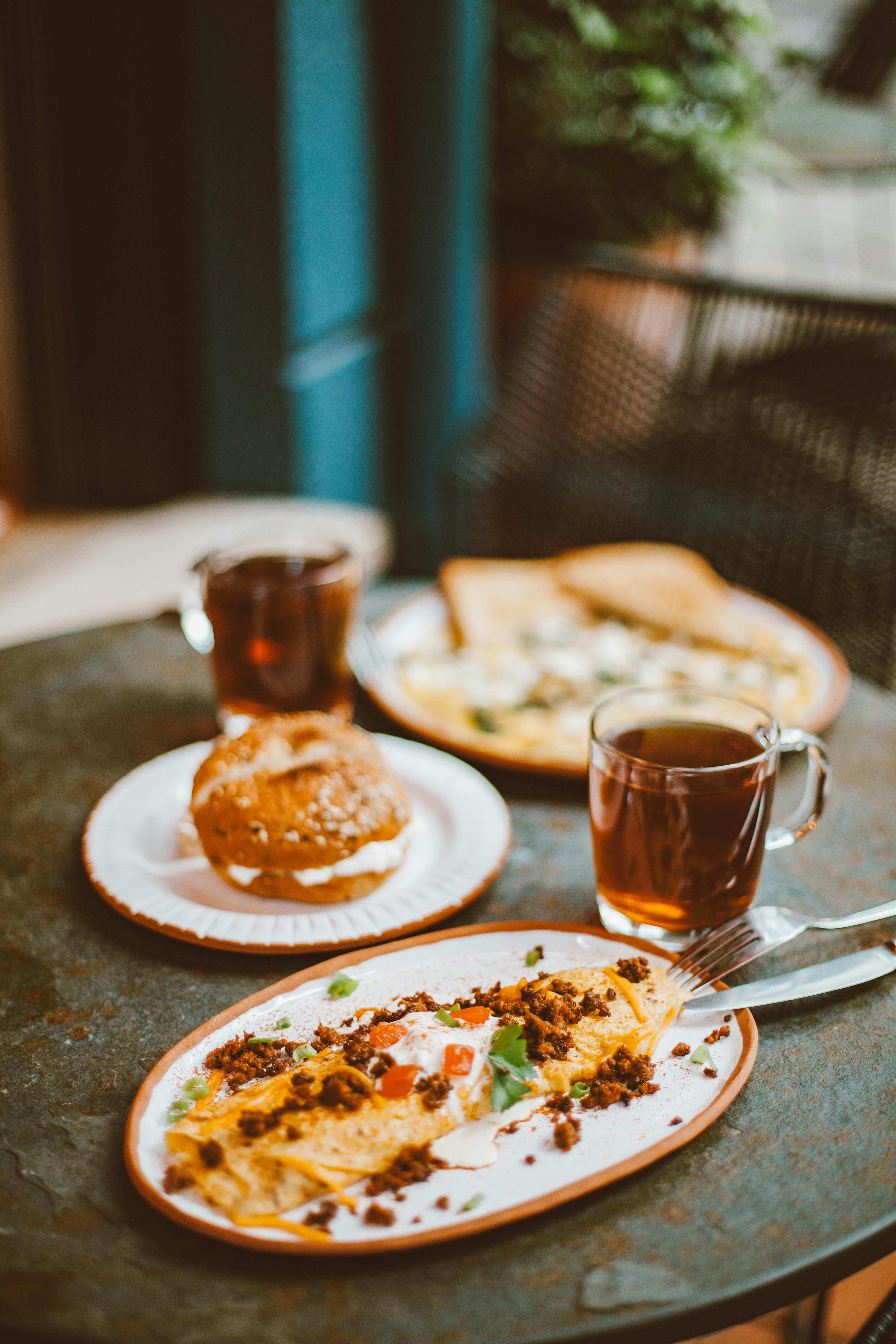 Homemade Breakfast on a Round Table · Free Stock Photo