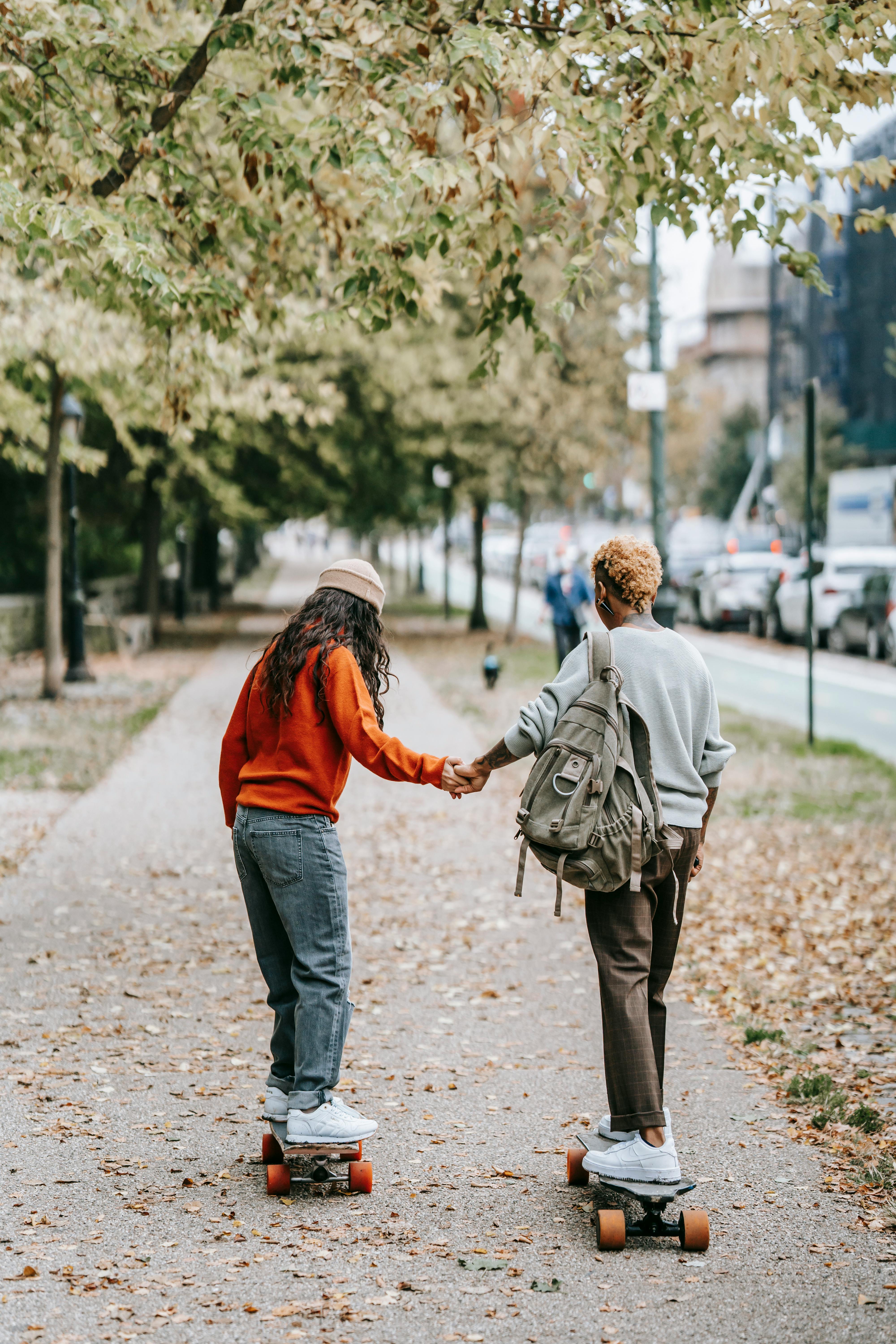 Two People On Skateboards · Free Stock Photo