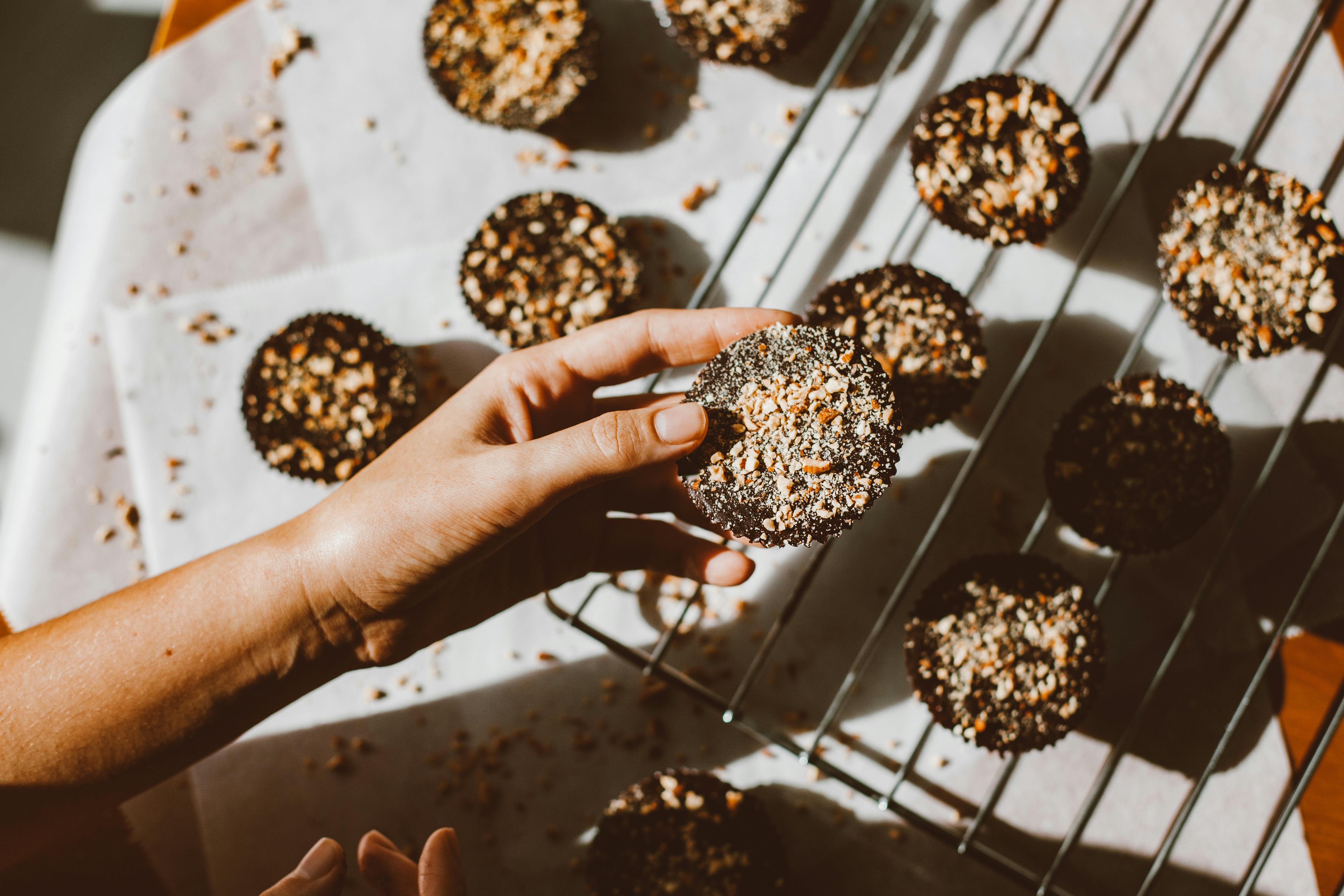 A Person Holding a Cookie · Free Stock Photo