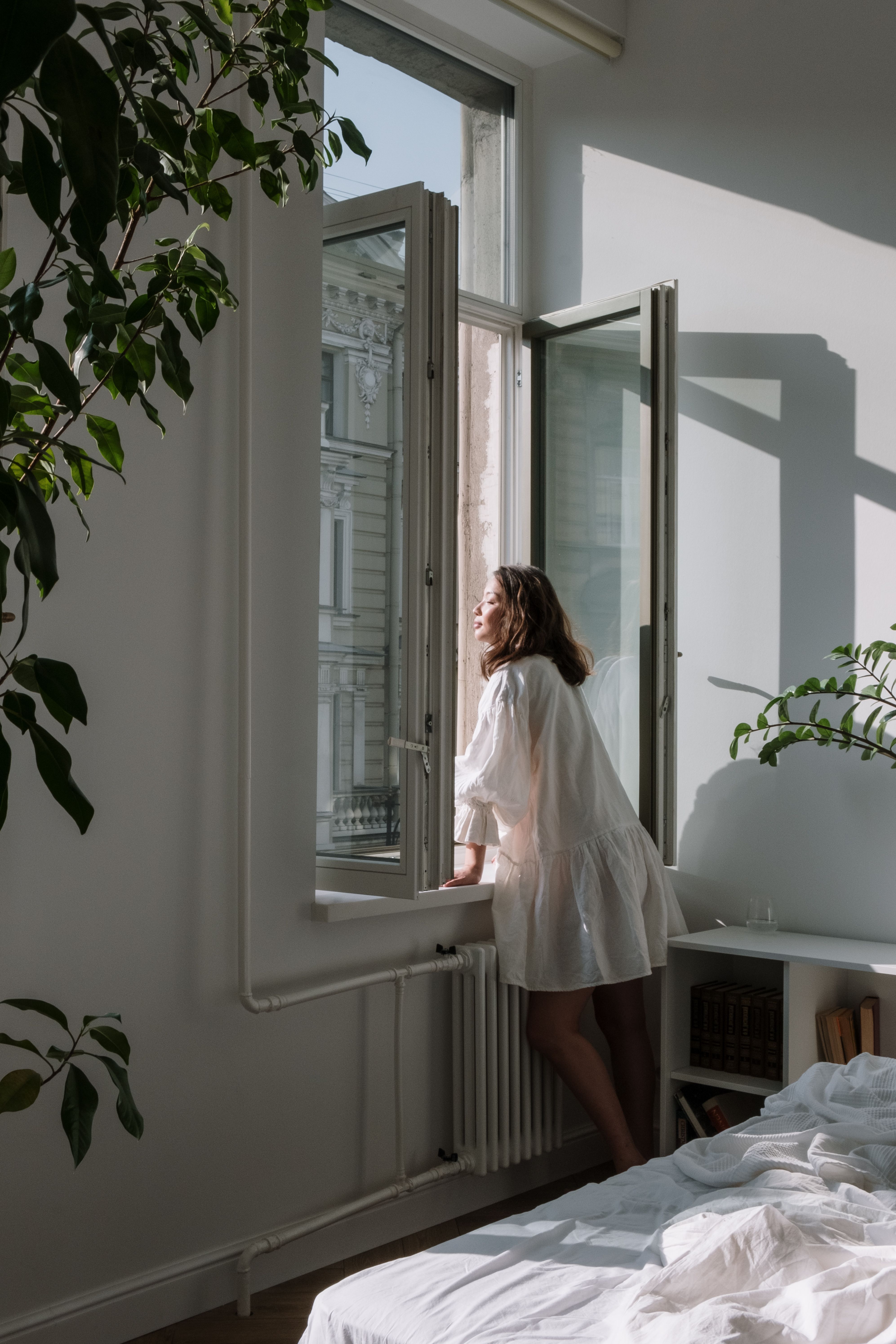 Woman in White Dress Standing by the Window · Free Stock Photo