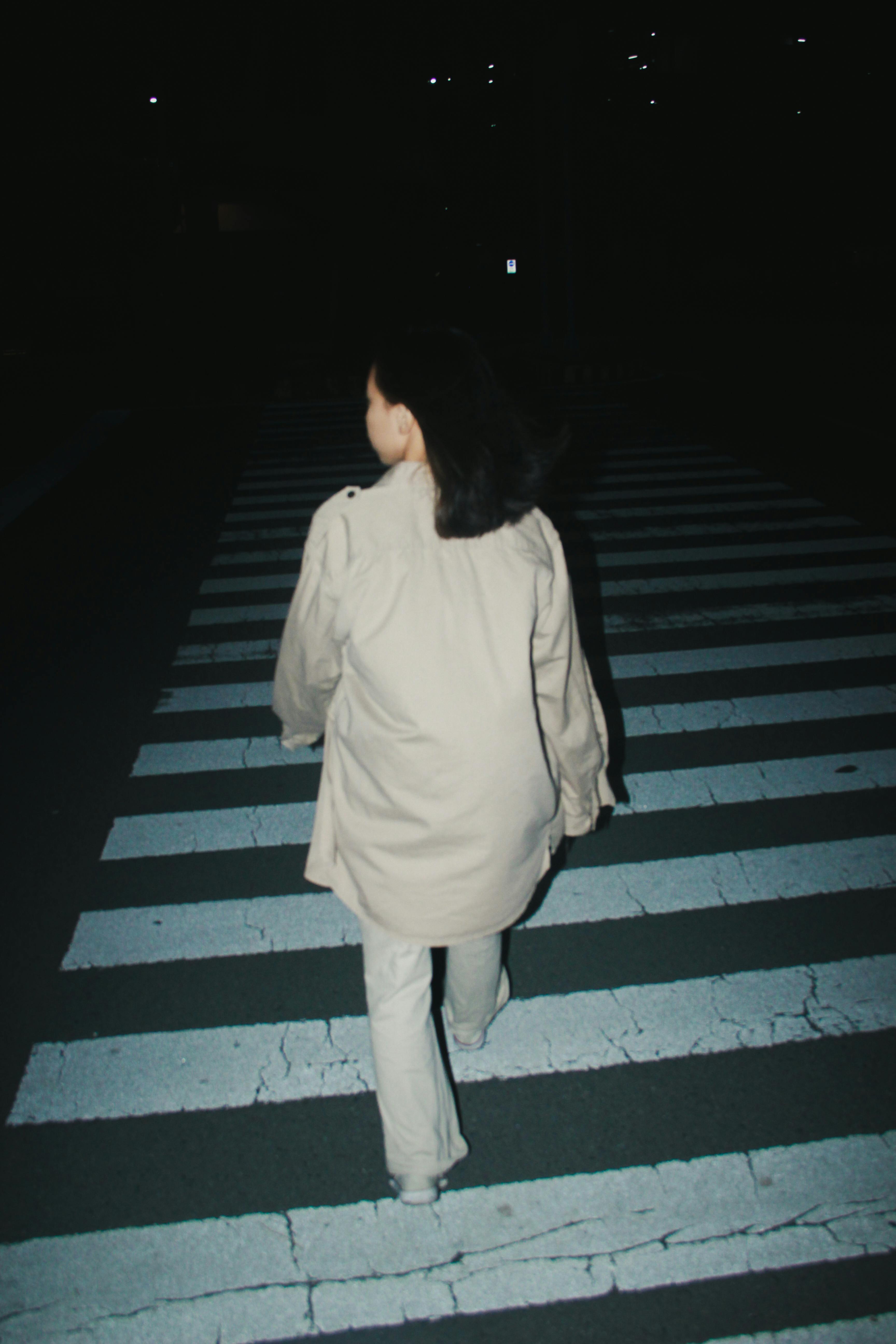 A Woman Crossing the Street Using the Pedestrian Crossing · Free Stock ...