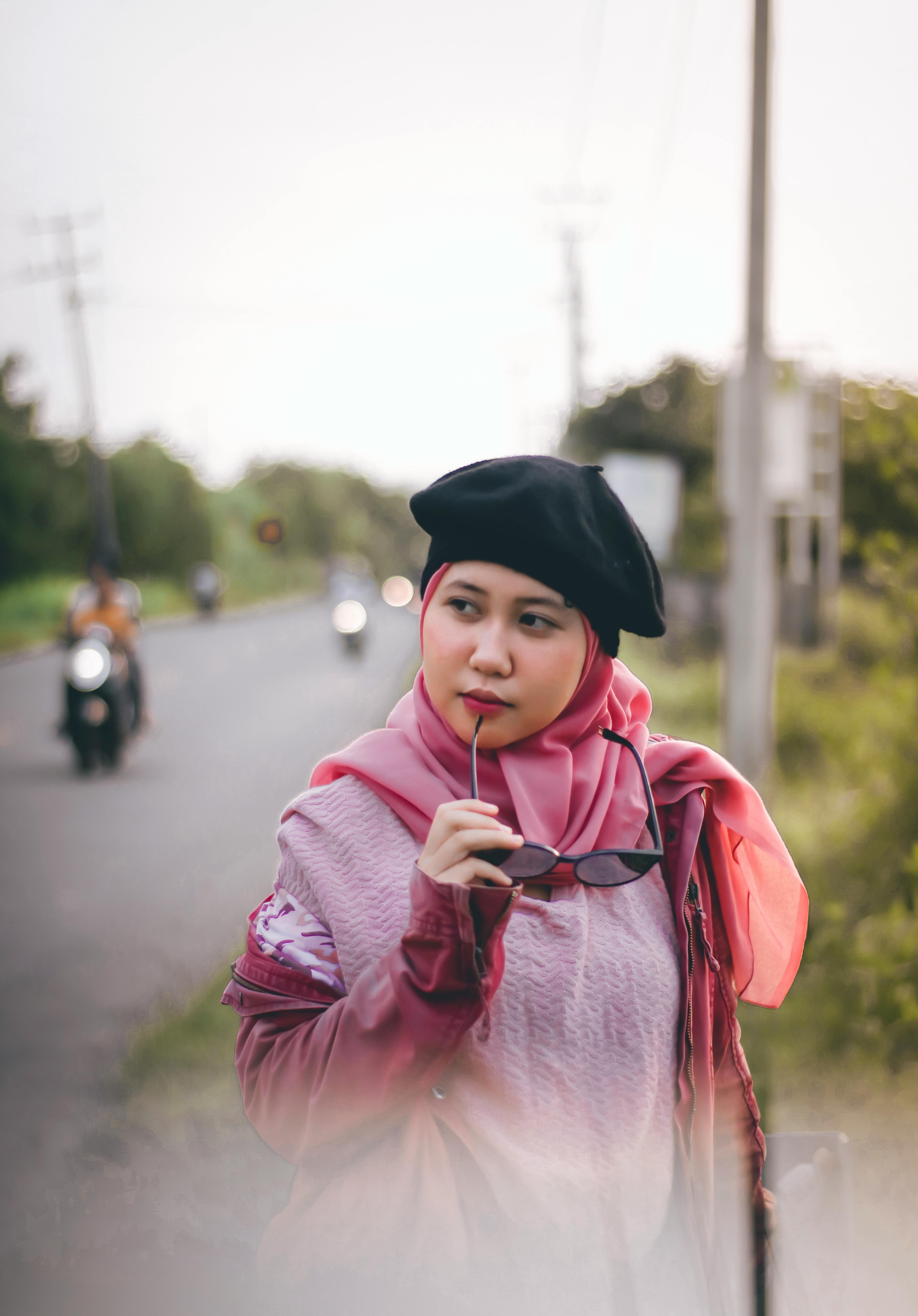 Woman Standing Beside a Tree · Free Stock Photo
