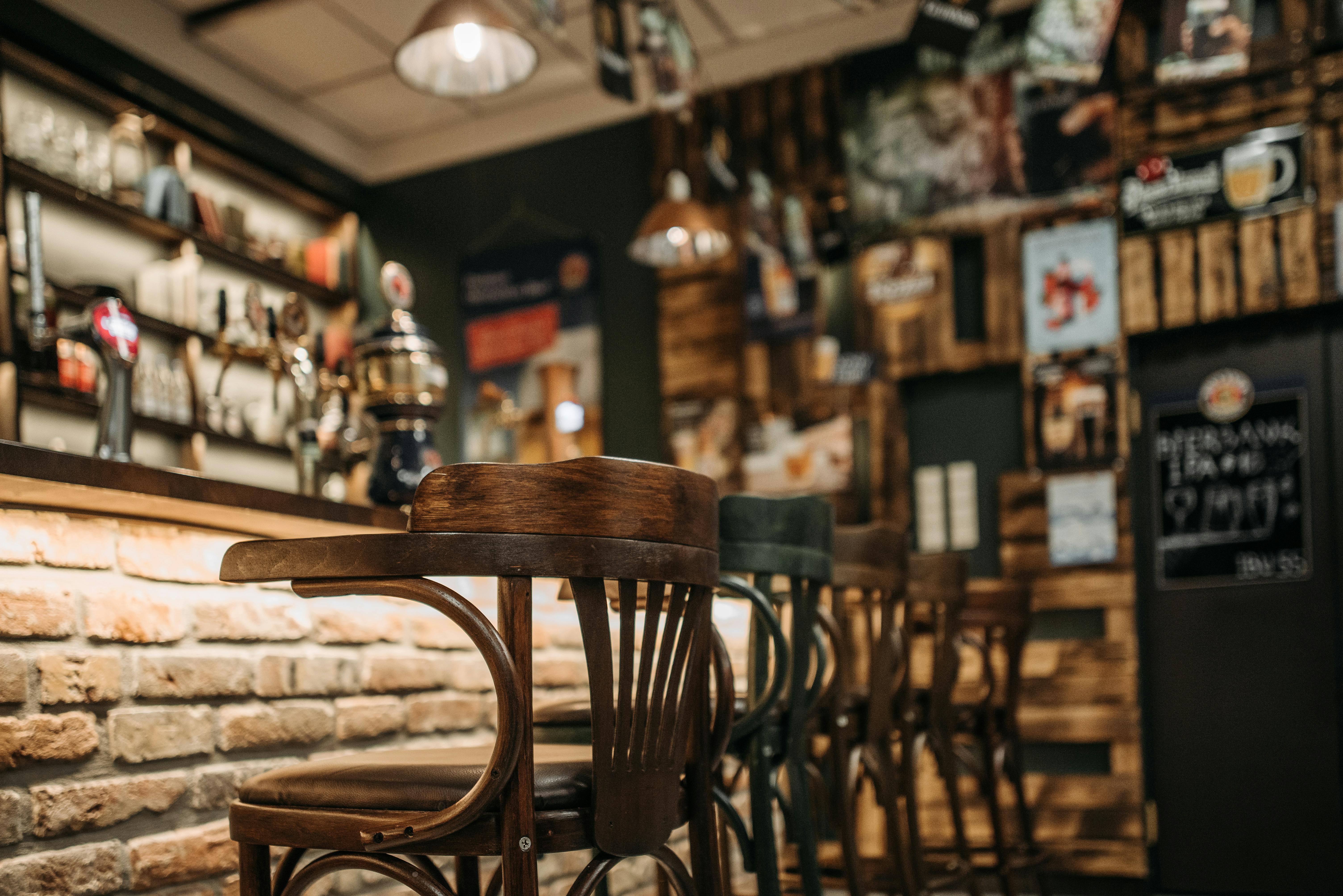 Photo of Wooden Stools in a Bar · Free Stock Photo