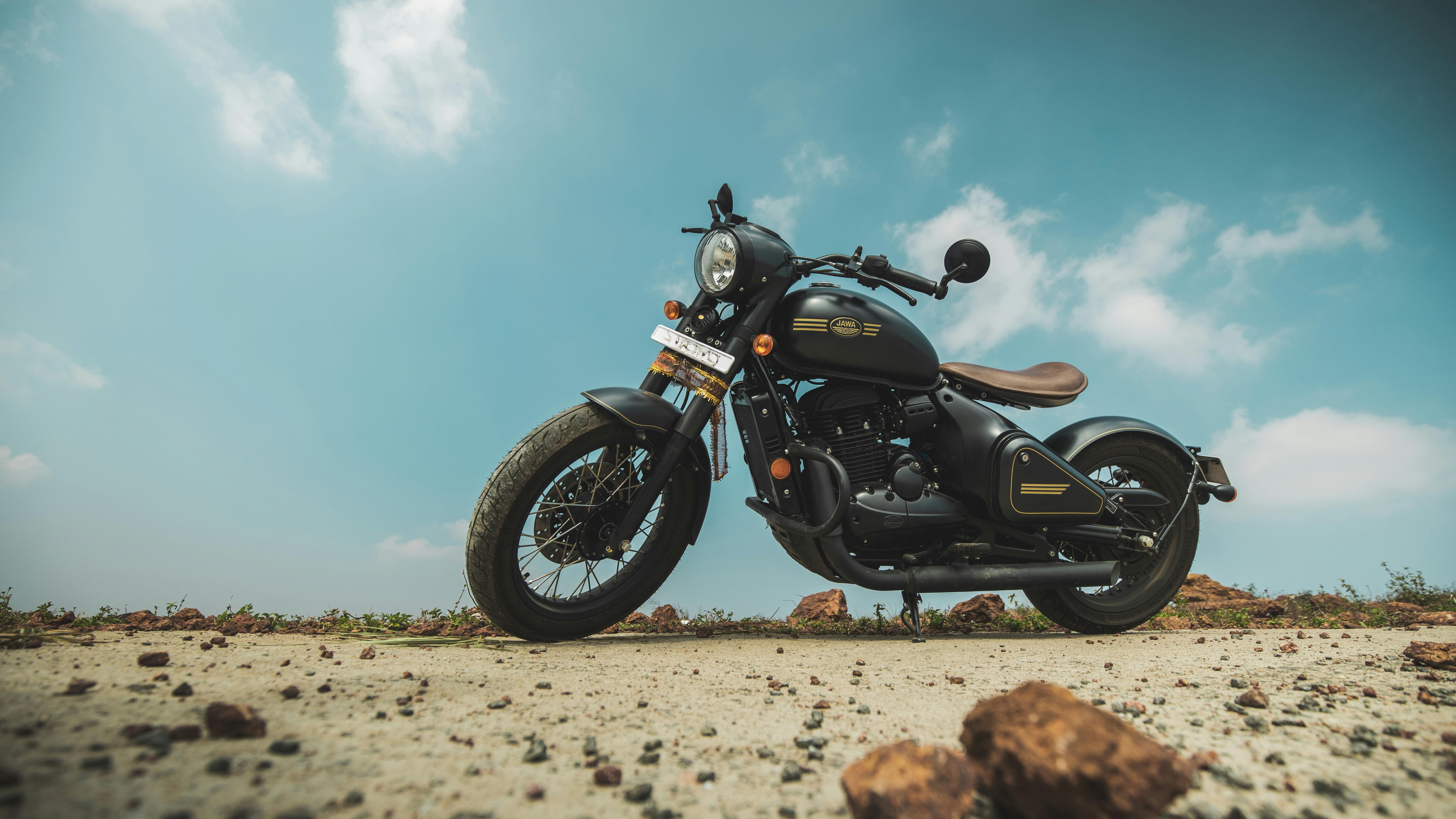 Gray and Silver Cruiser Motorcycle Near Green Grass Lawn · Free Stock Photo