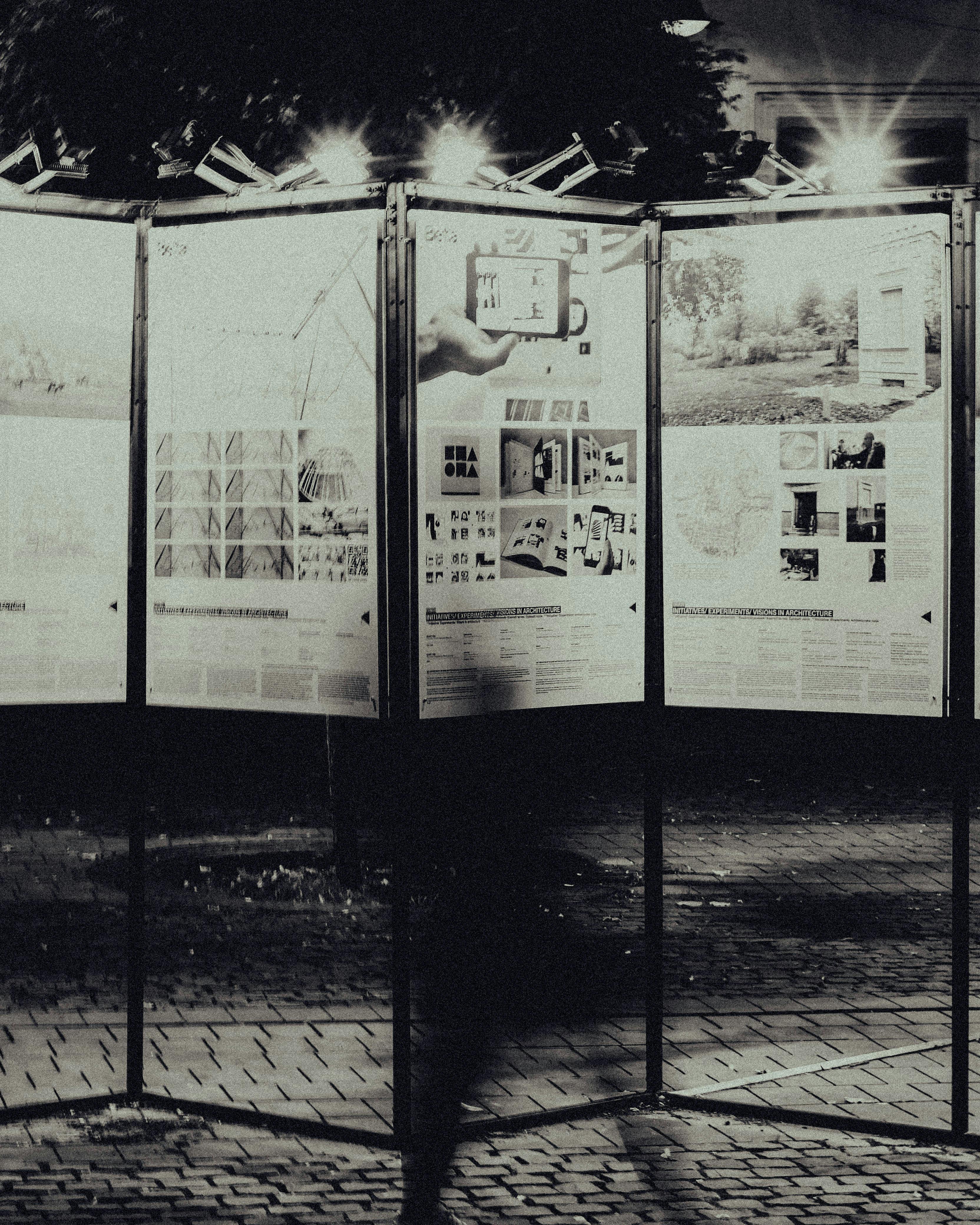 Grayscale Photo of Posters on the Street · Free Stock Photo