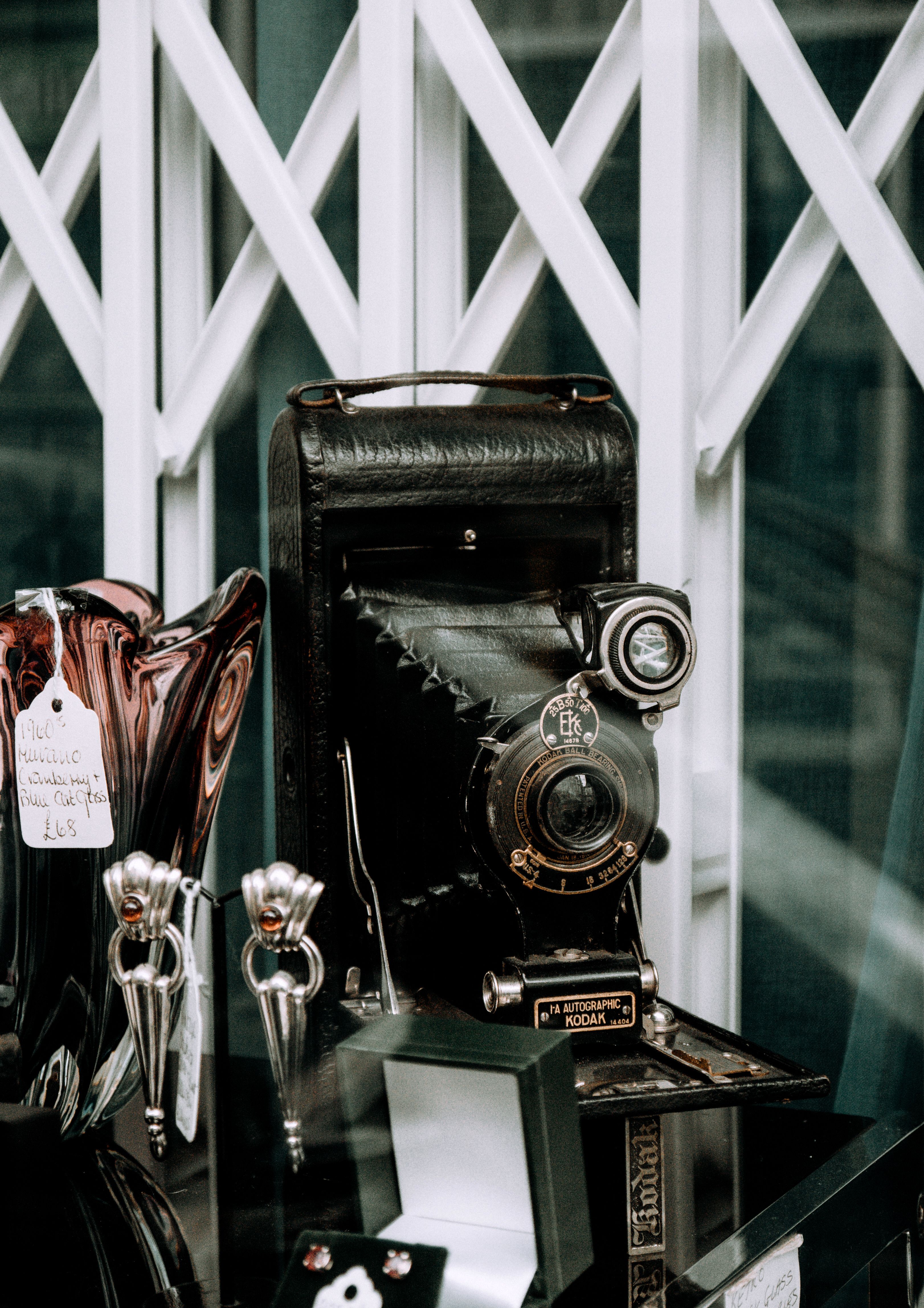 Vintage Camera on Display Window · Free Stock Photo
