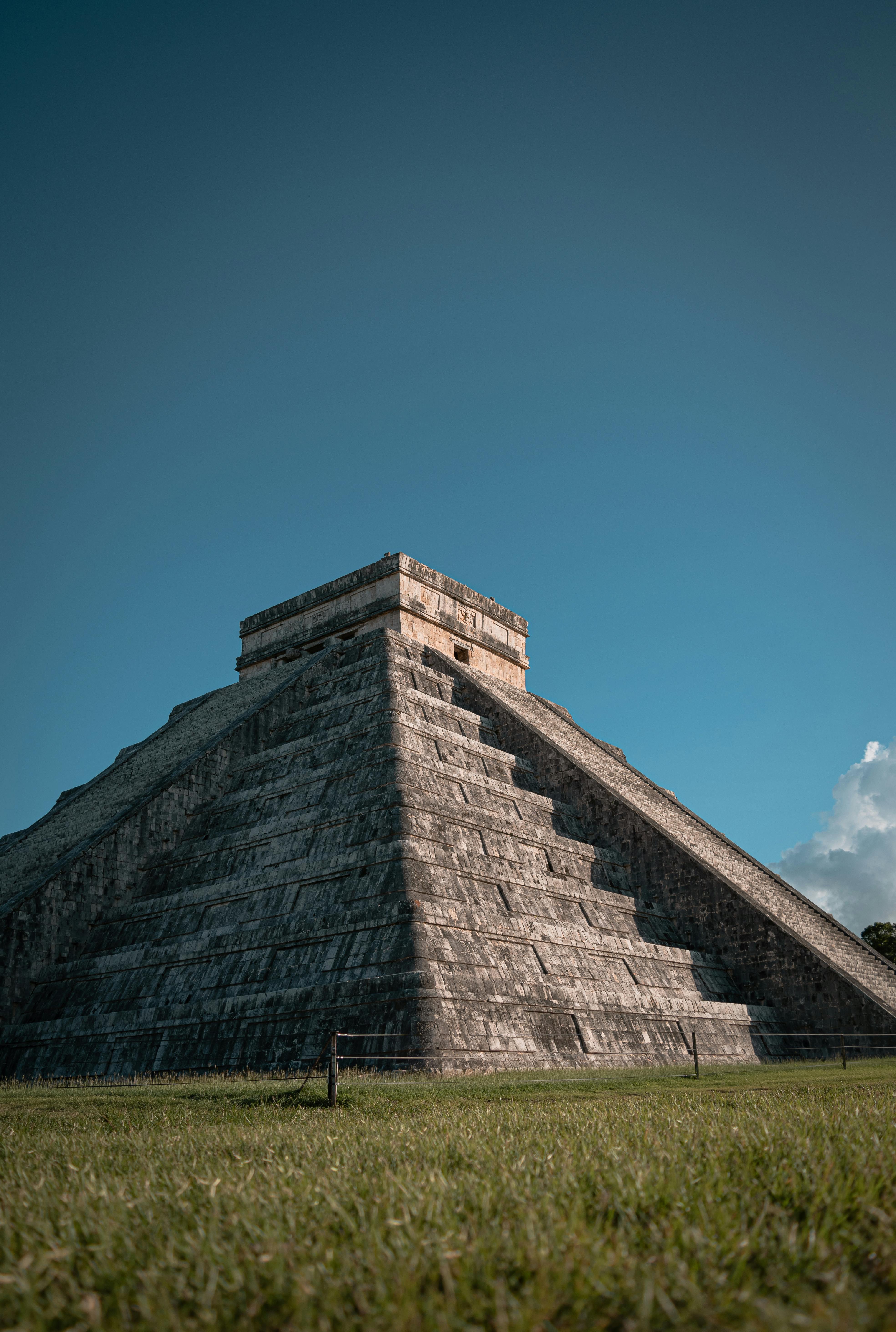 Gray Pyramid on Grass Field during Day · Free Stock Photo
