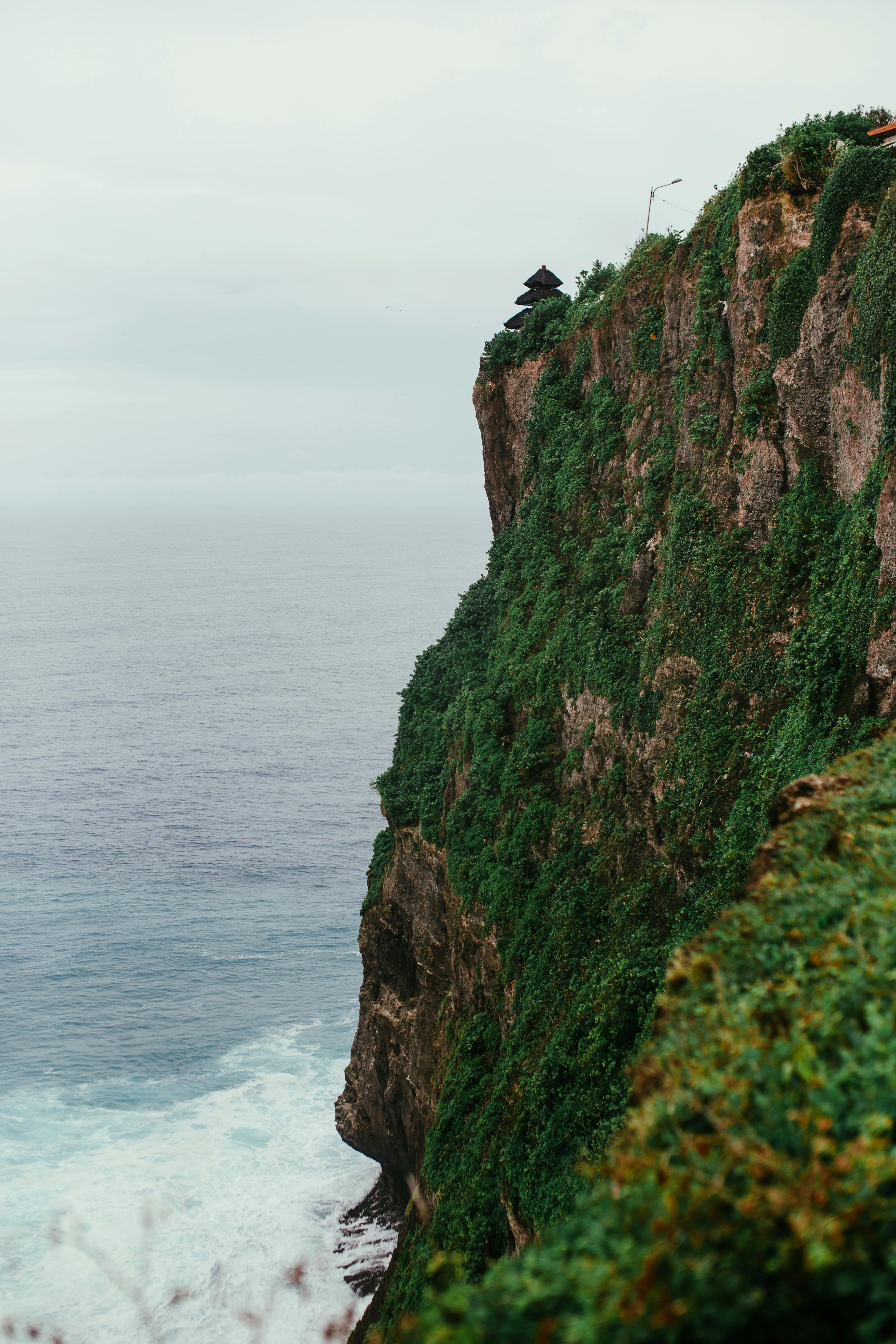View of a Steep Cliff Over The Ocean · Free Stock Photo