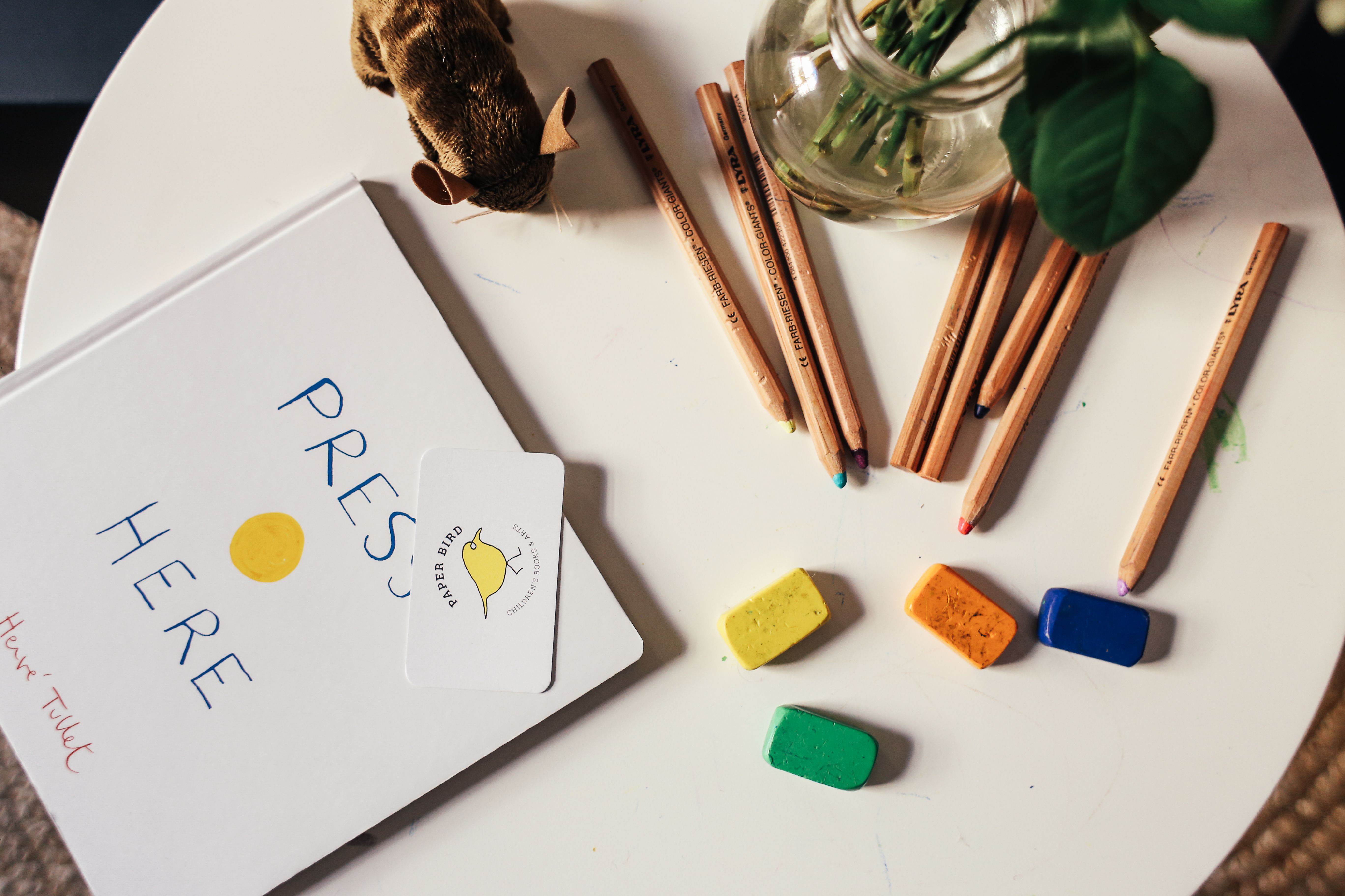 Wooden Colored Pencil on White Round Table · Free Stock Photo