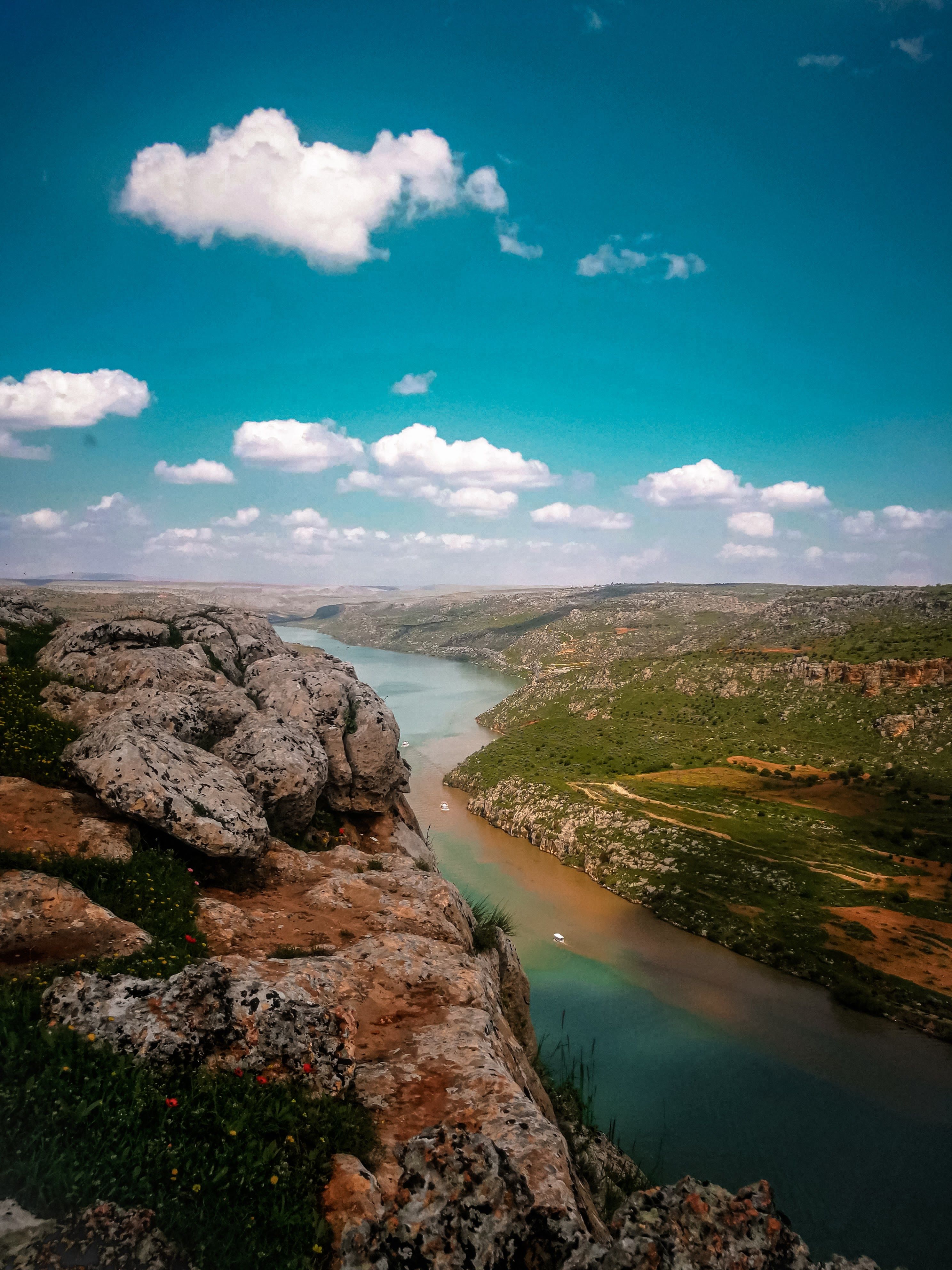 Picturesque landscape of rough curvy river coast · Free Stock Photo