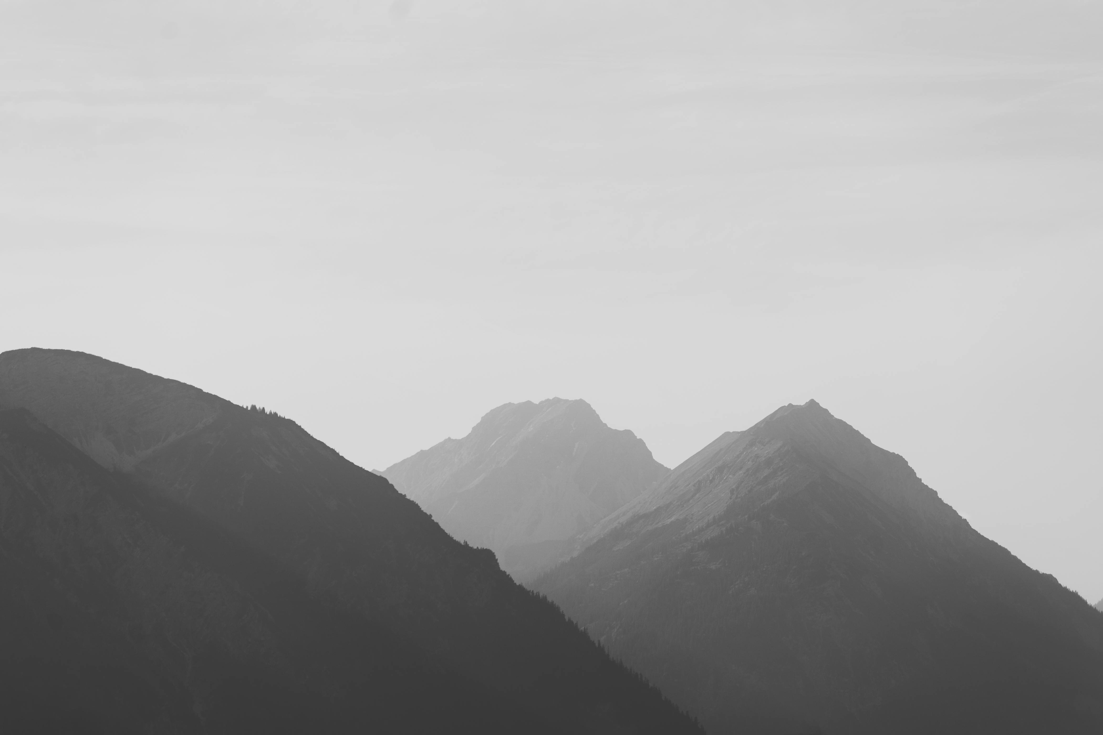 Grayscale Photo of Mountains · Free Stock Photo