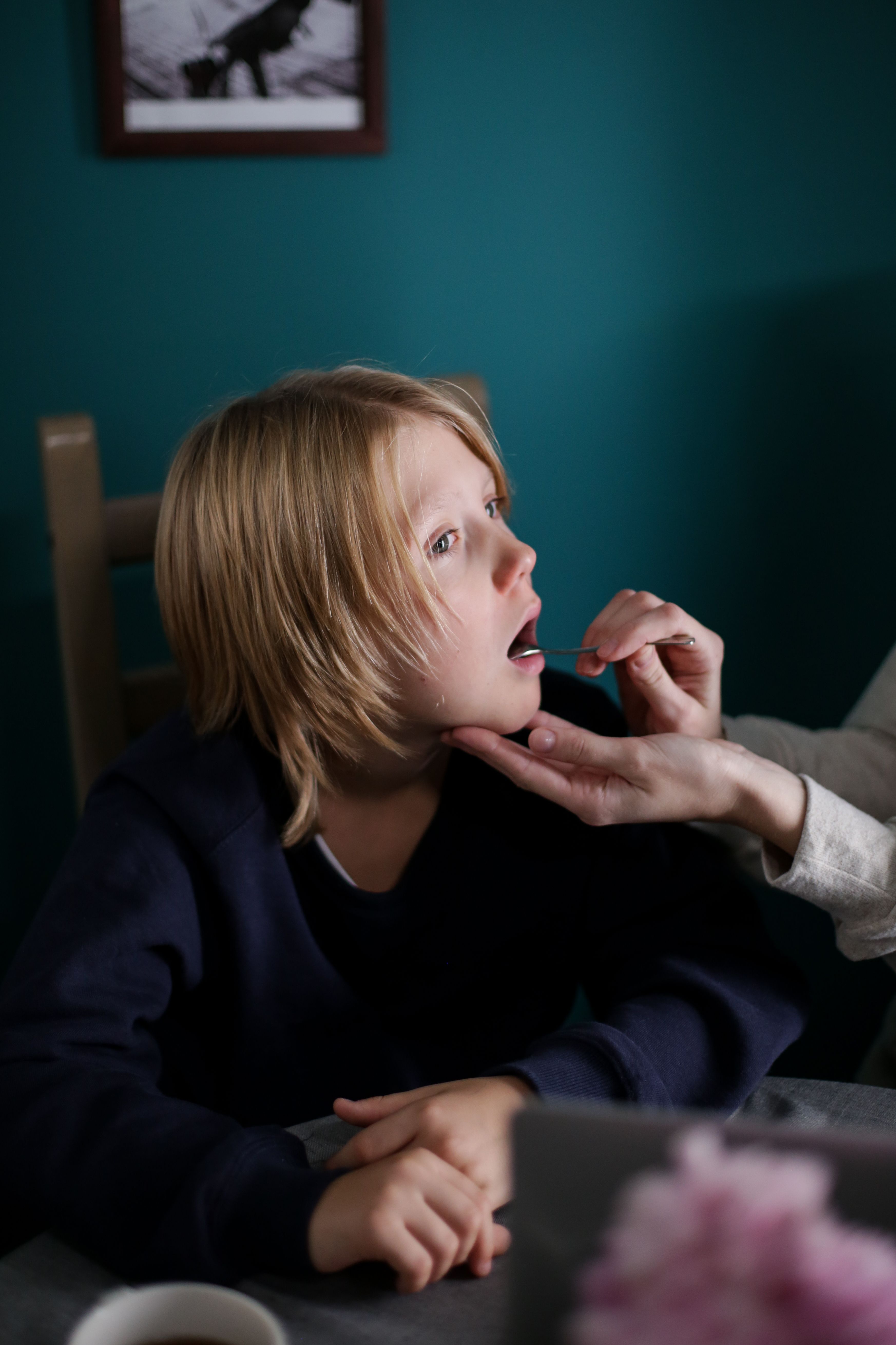 A Sick Boy in Blue Long Sleeves · Free Stock Photo