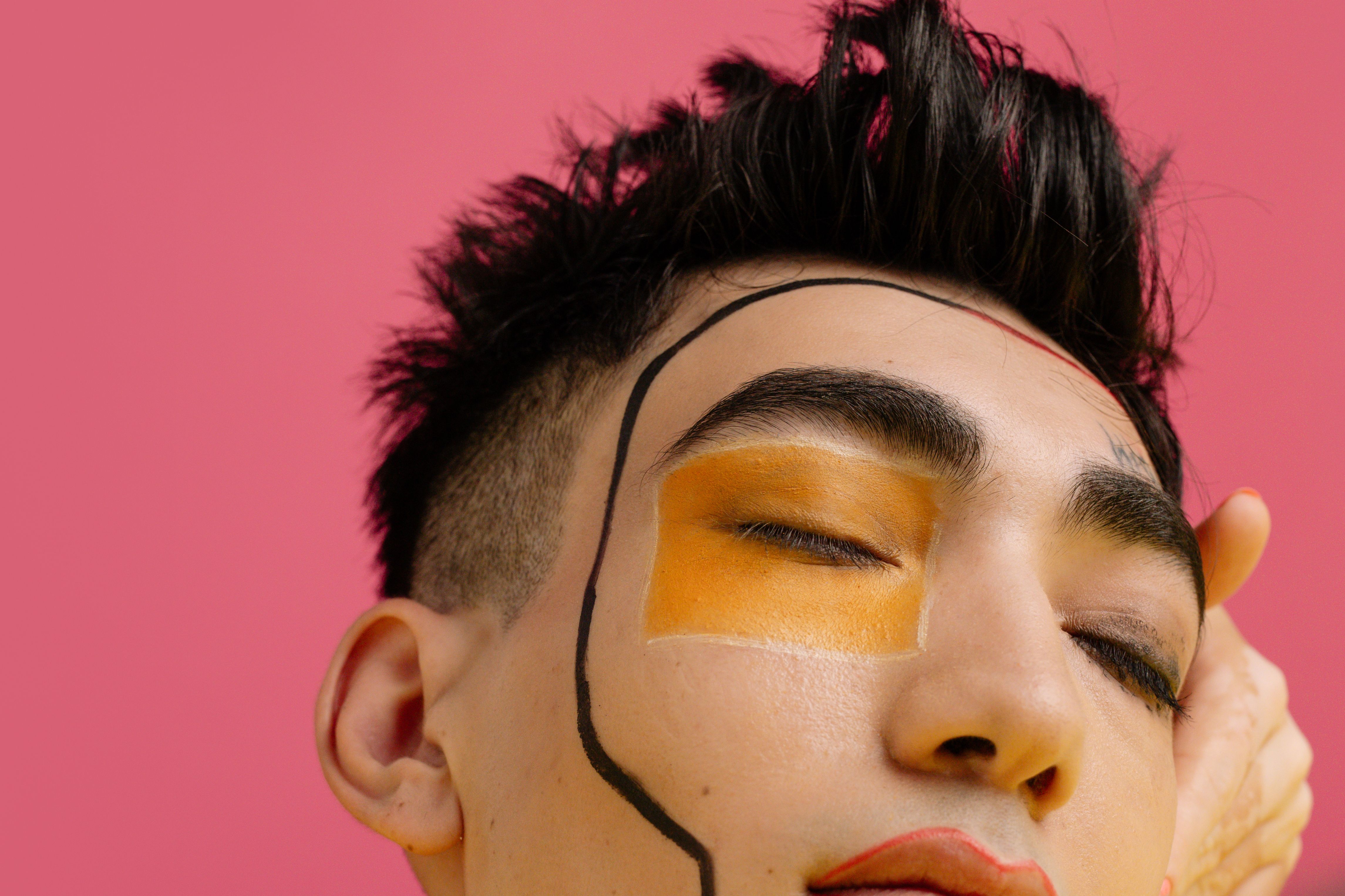Close-up Shot of a Man Face with Make up · Free Stock Photo
