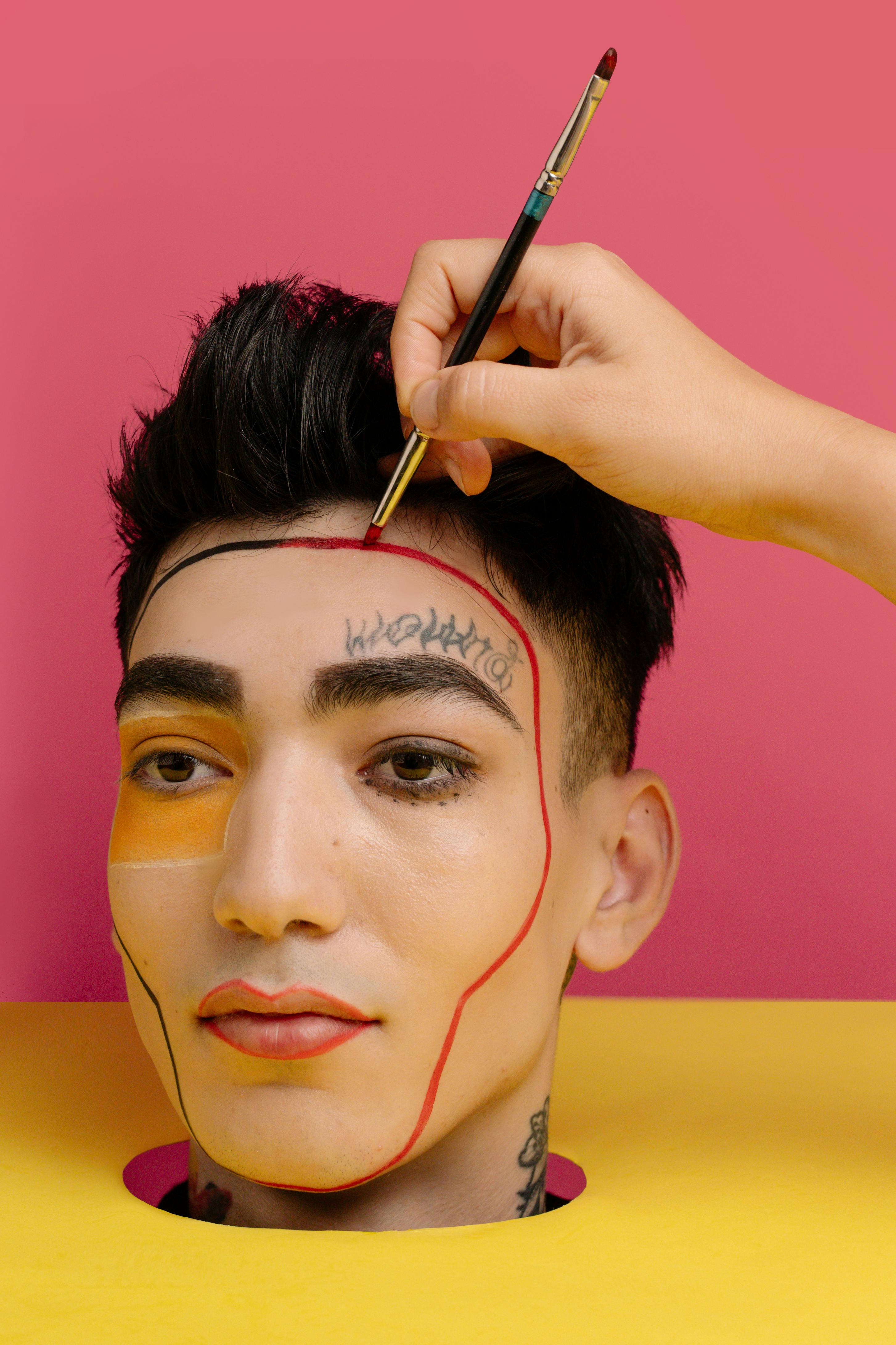 Woman Hand over Man Face with Makeup · Free Stock Photo