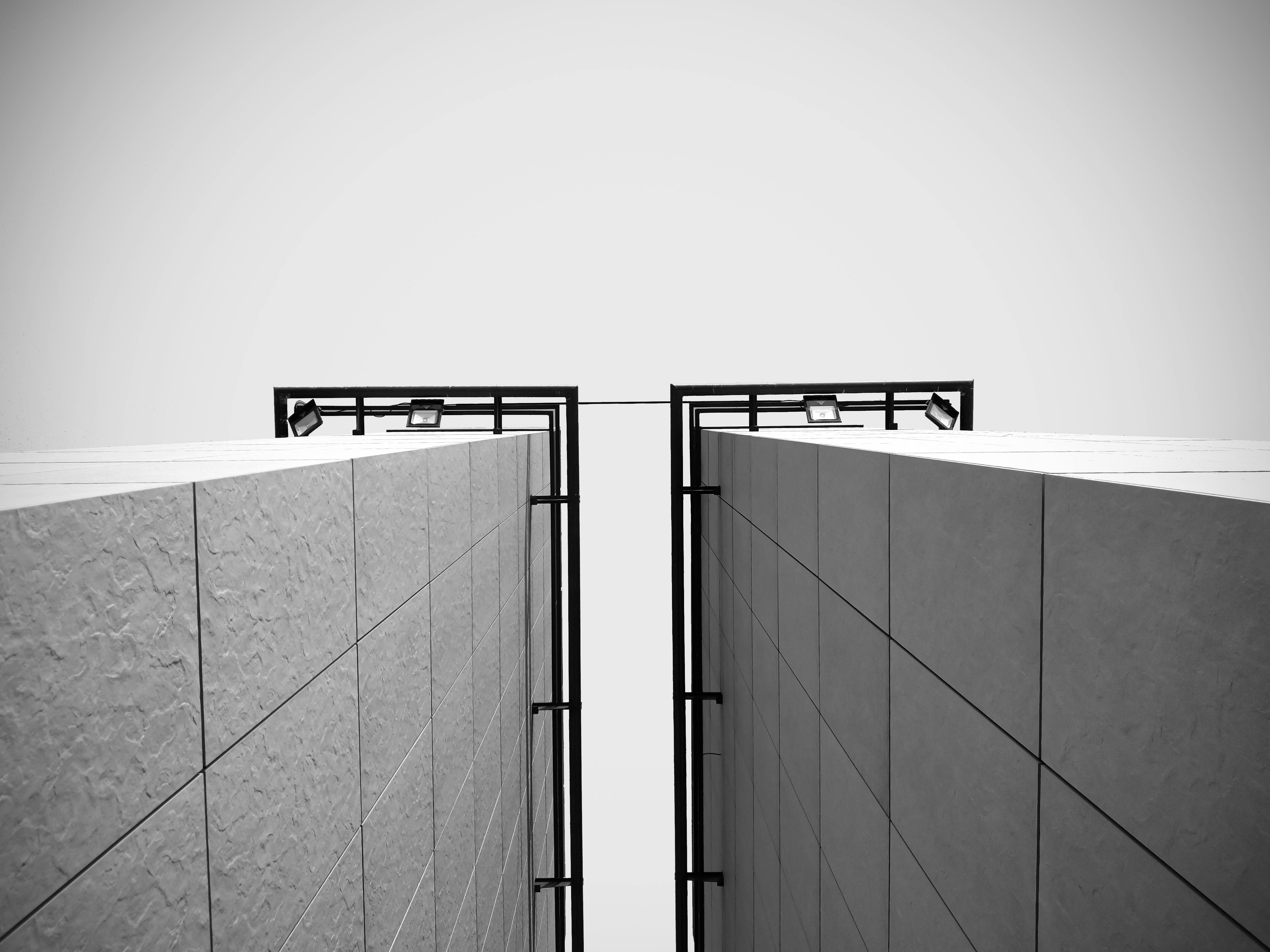 Grayscale Photo of Concrete Wall · Free Stock Photo