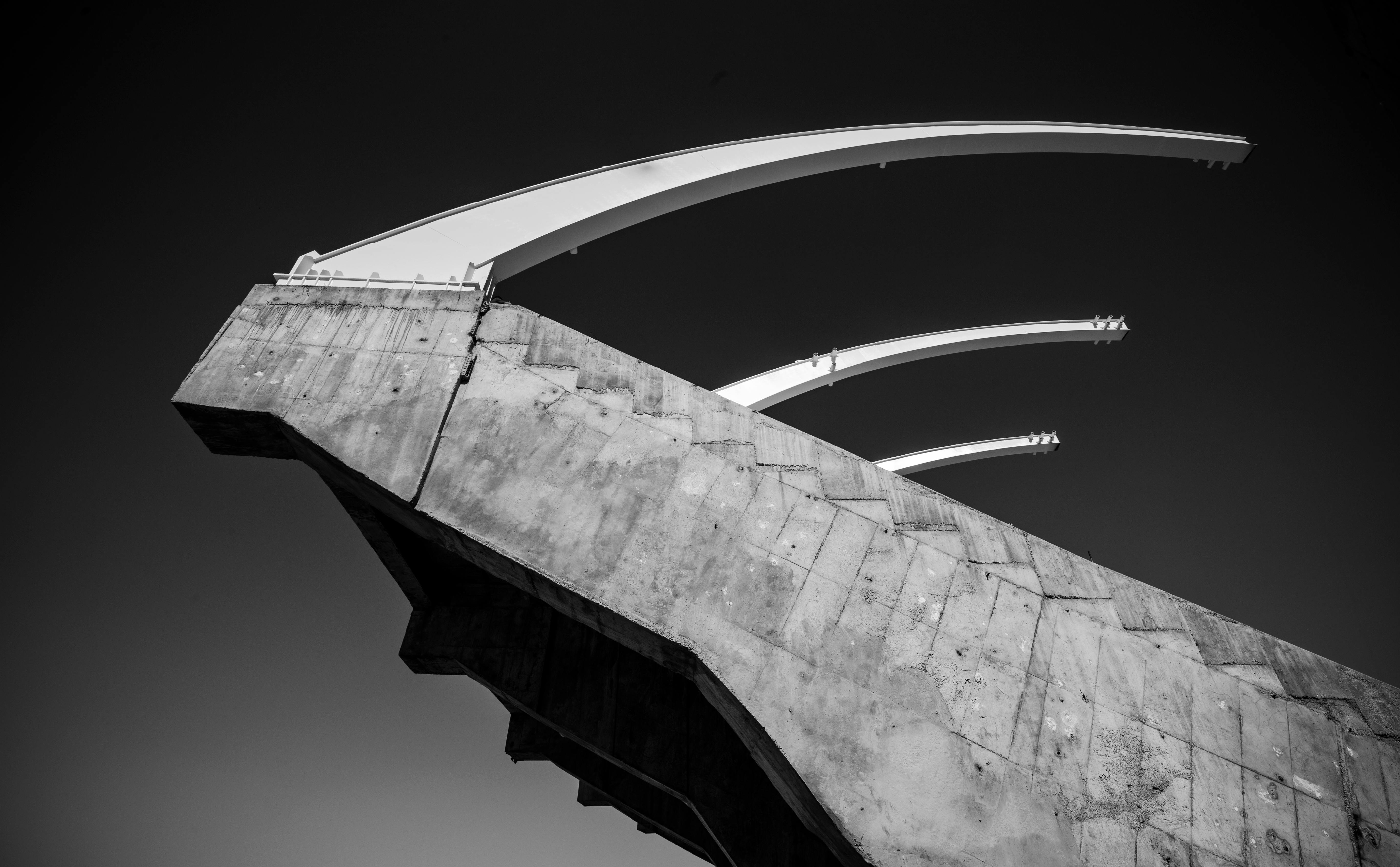 Grayscale Photo of a Metal Structure · Free Stock Photo