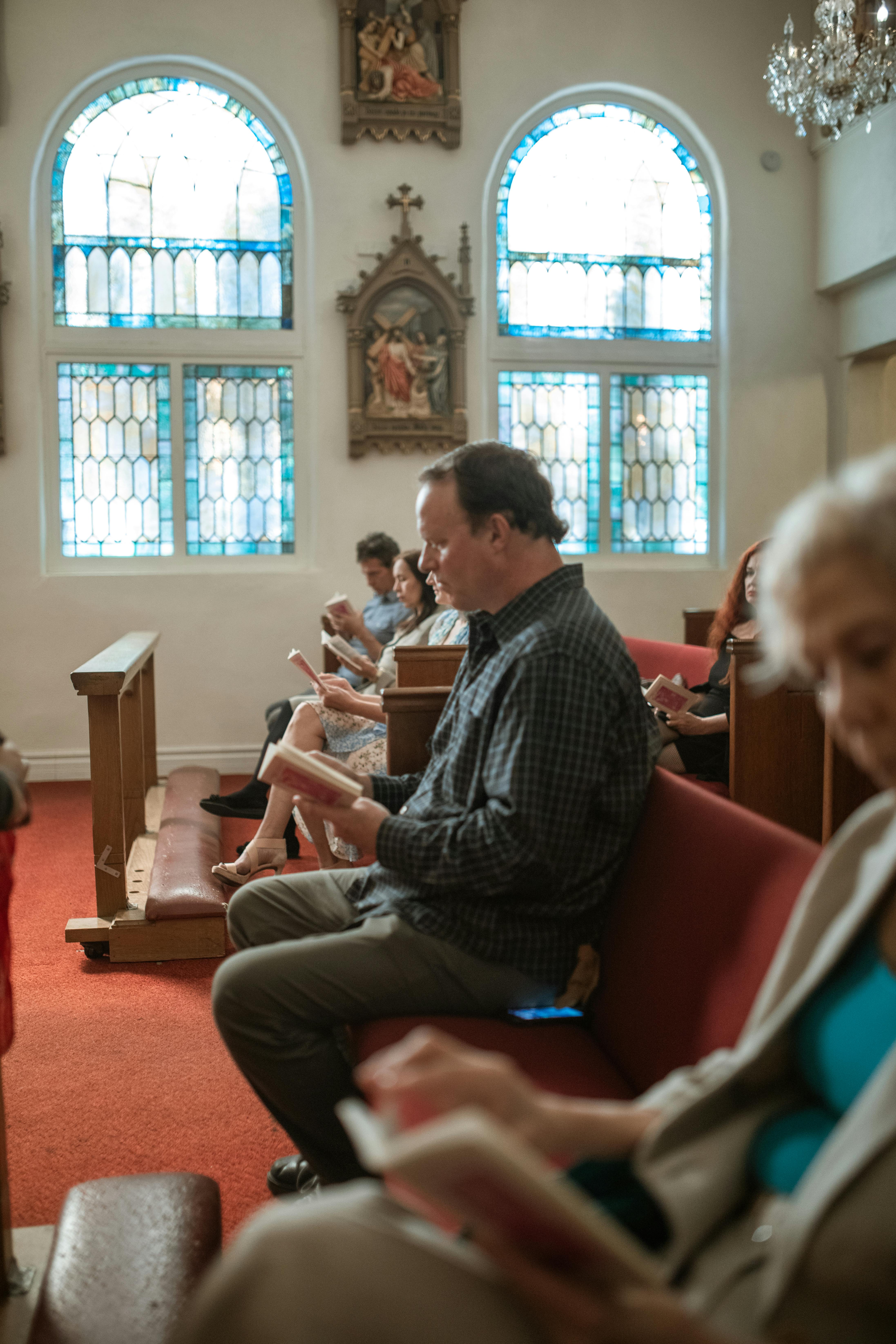 Female Priest interacts with Parishioners · Free Stock Photo