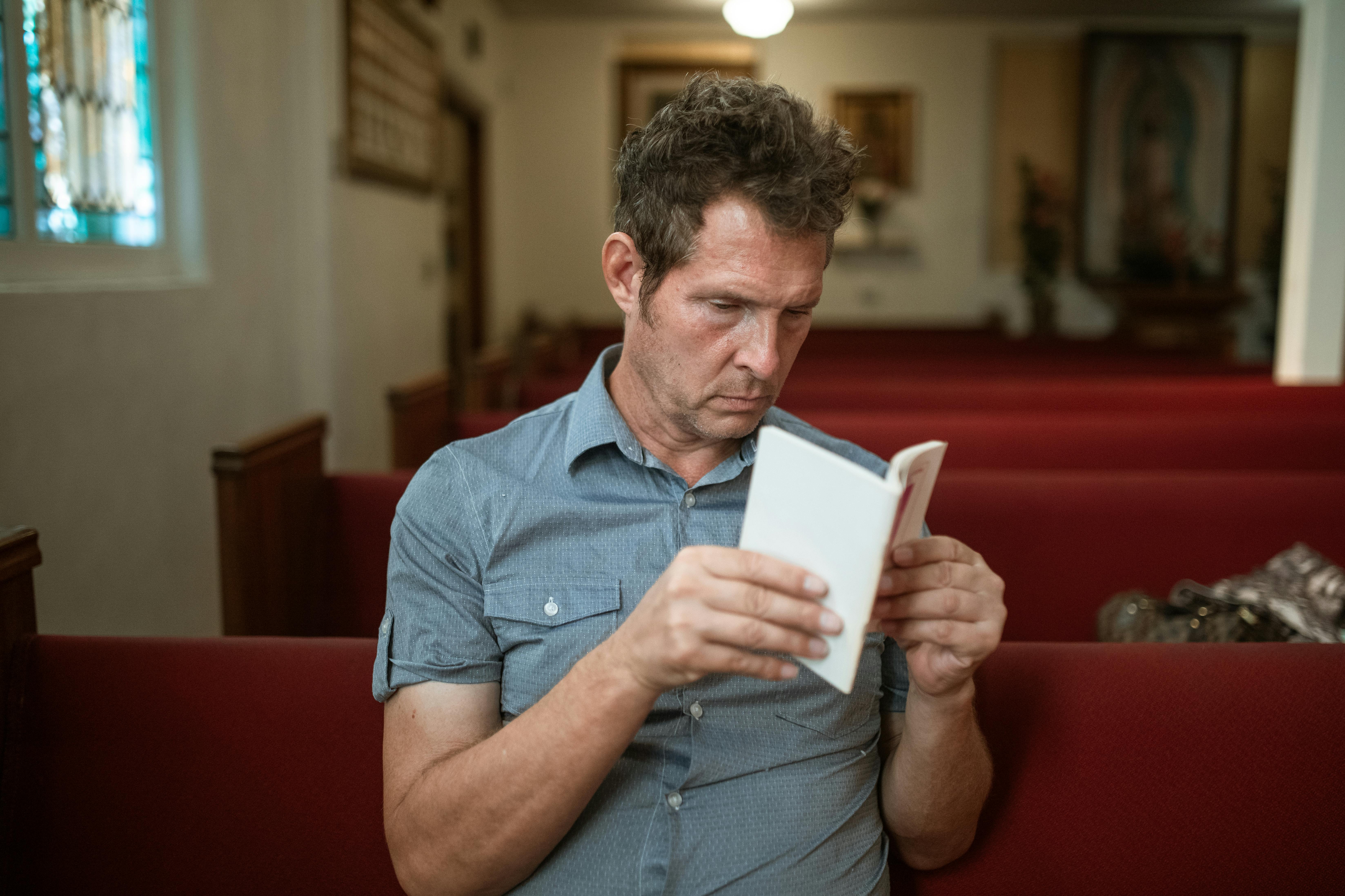 Man Raising His Left Hand · Free Stock Photo