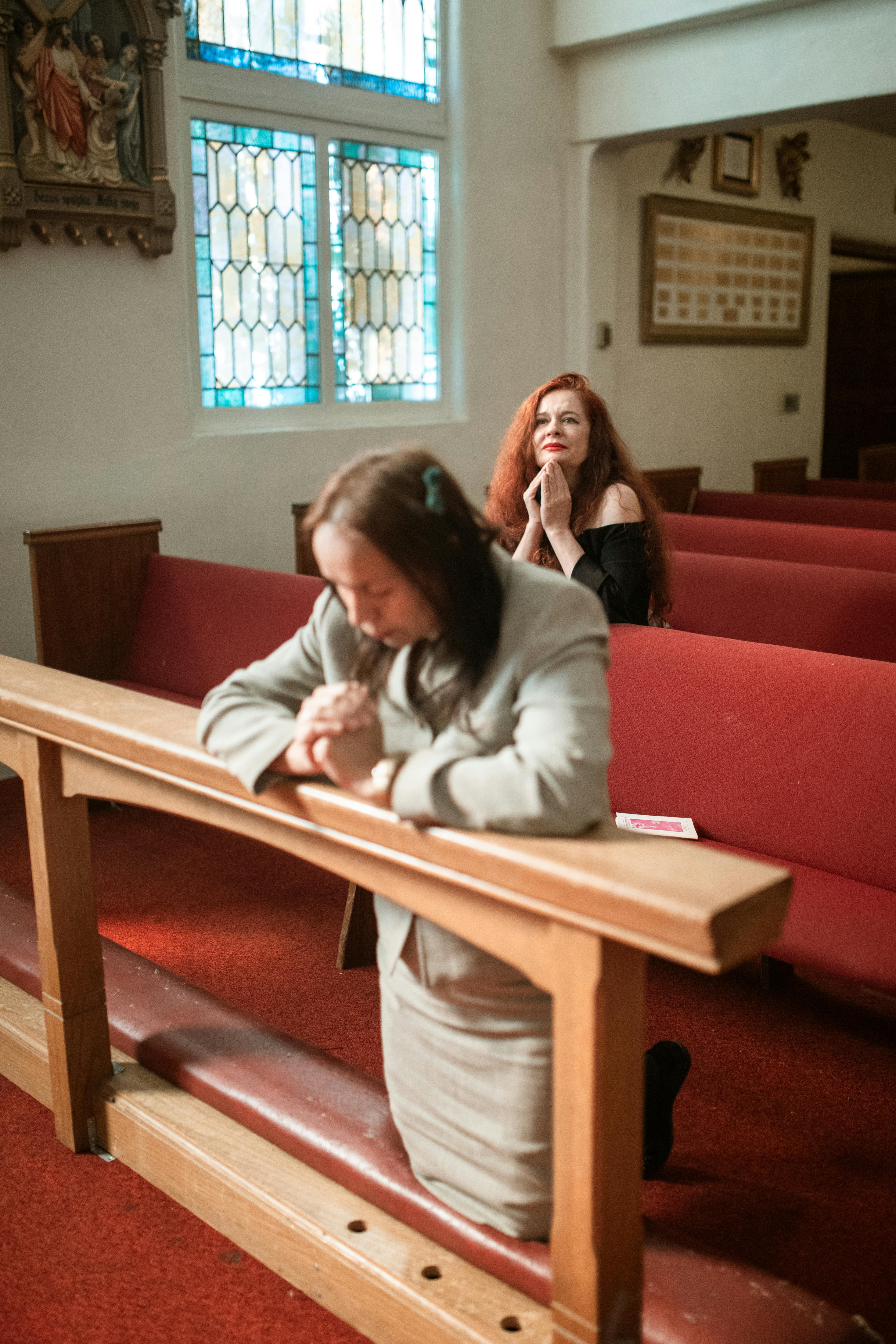 Two Women Praying inside the Church · Free Stock Photo