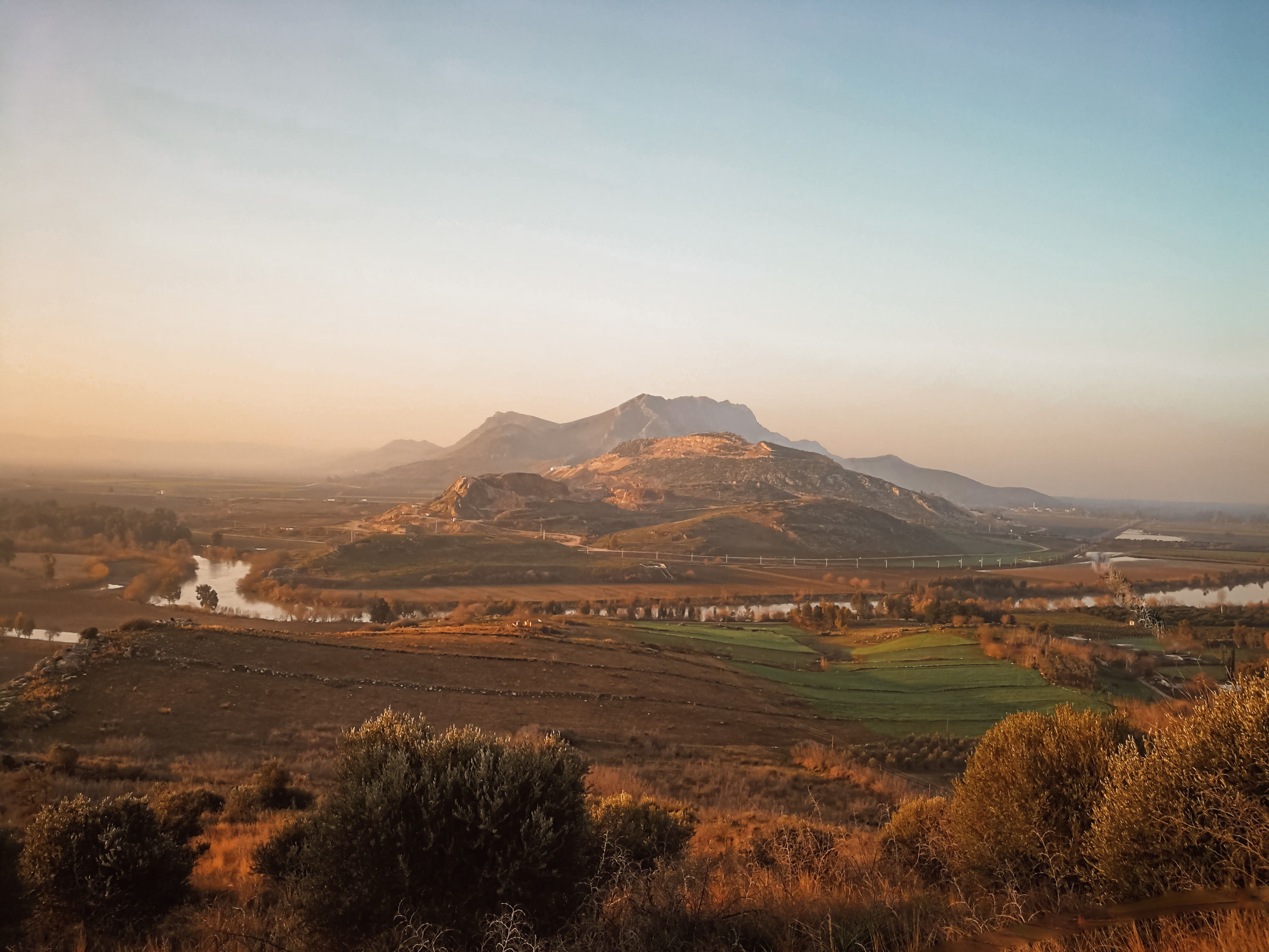 Breathtaking mountainous valley with curvy river · Free Stock Photo