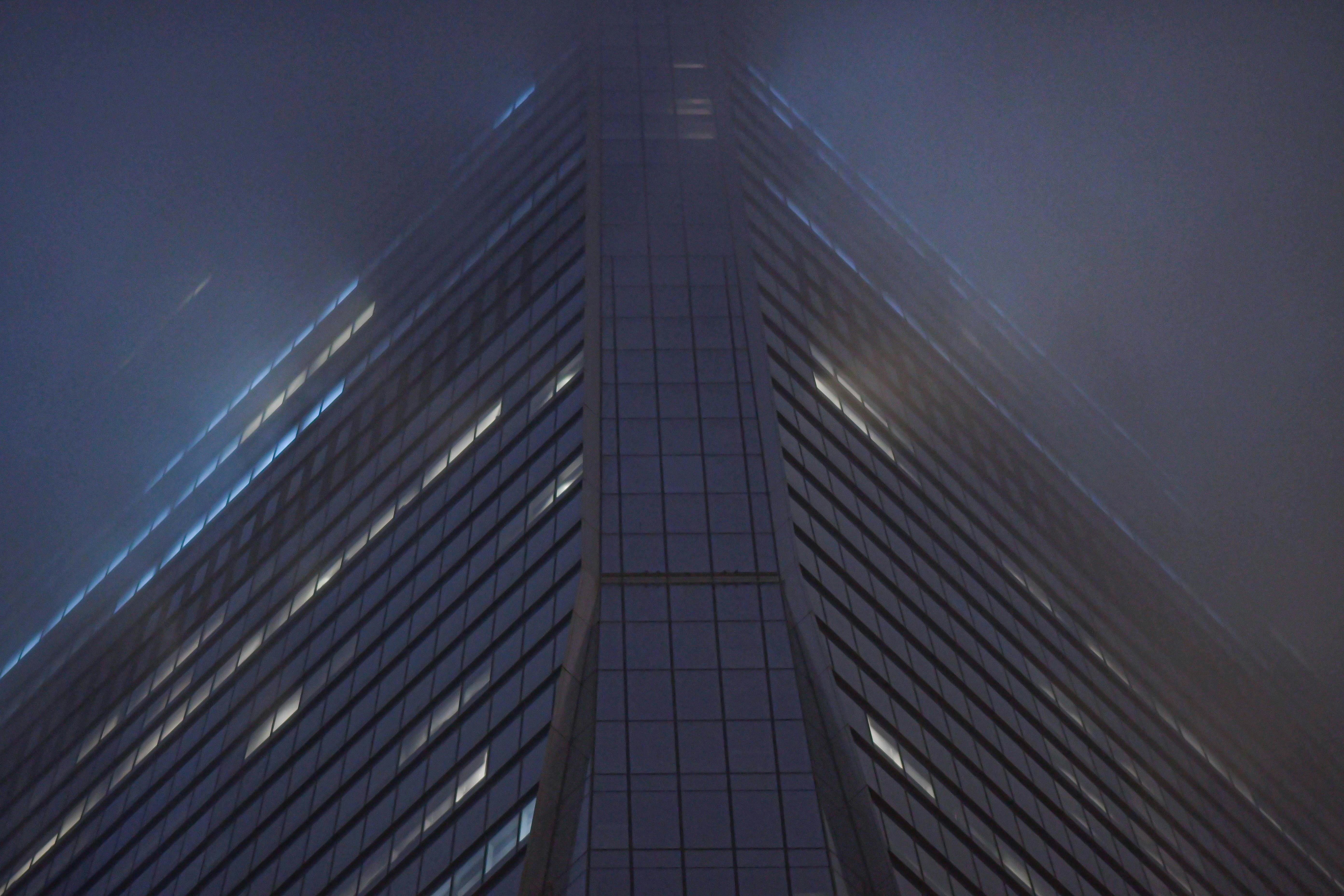 Low-Angle Shot of a Concrete Building · Free Stock Photo