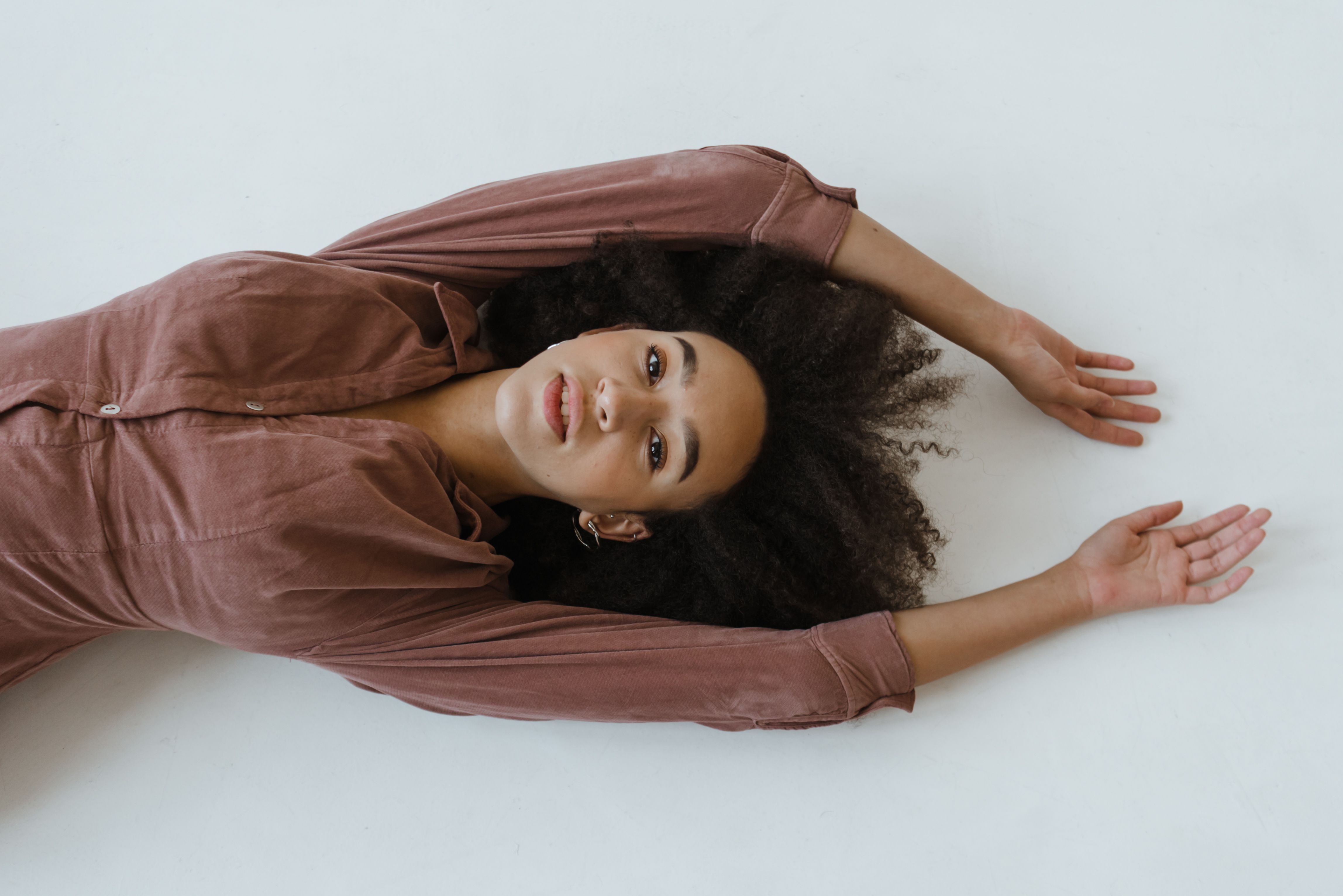 Woman Lying on the Floor · Free Stock Photo
