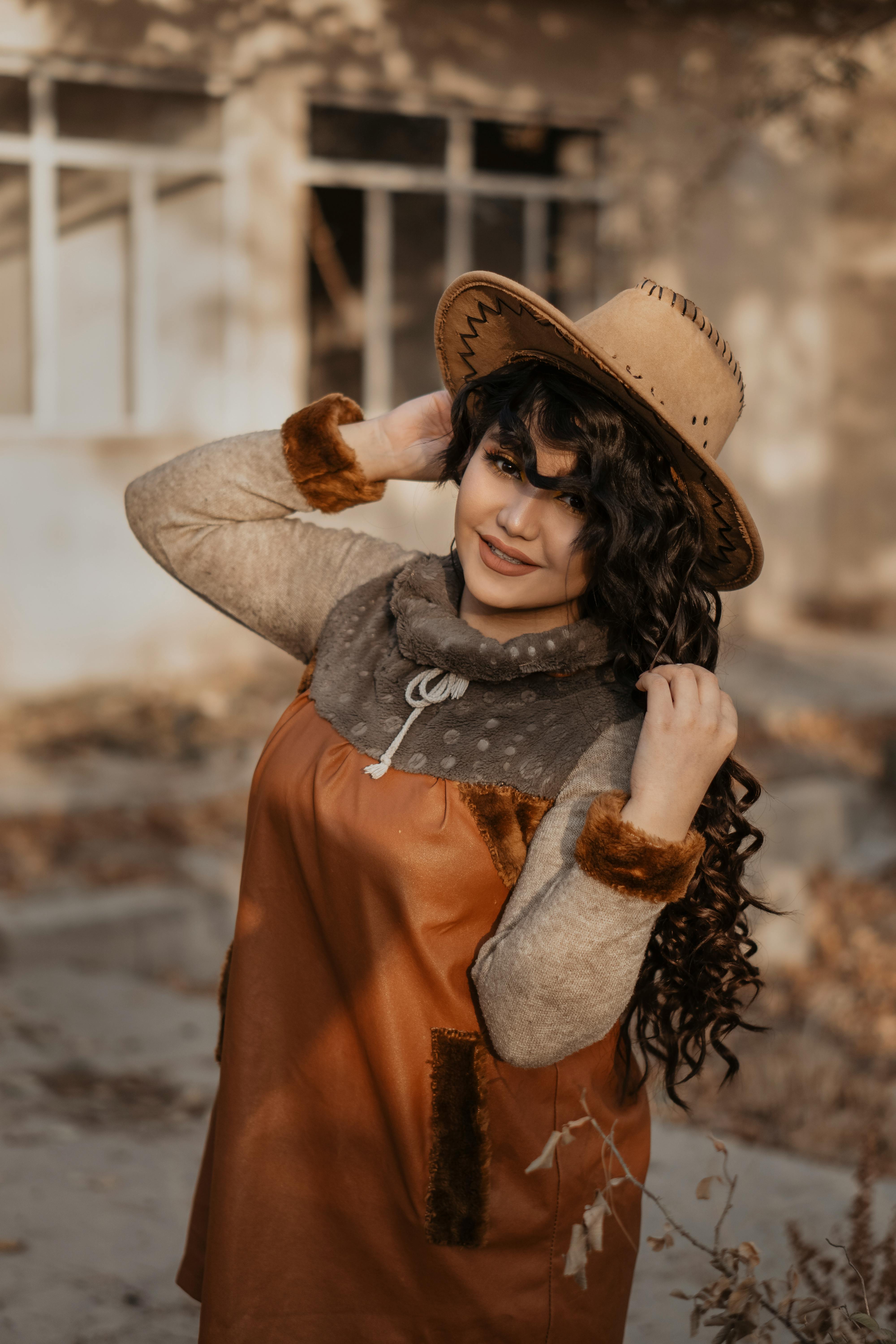 Trendy ethnic woman in stylish outfit smiling · Free Stock Photo