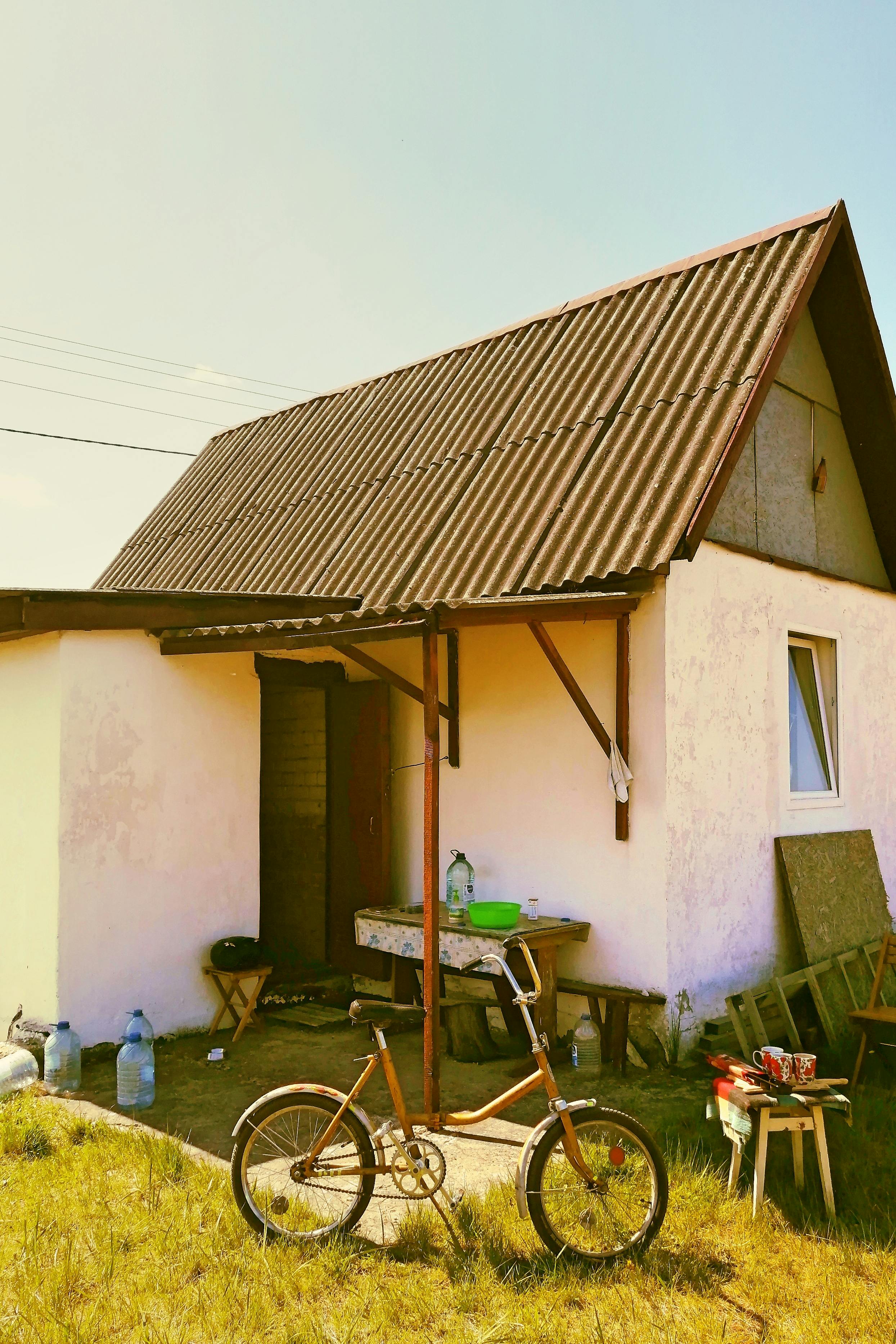 A Bicycle Parked Outside a House · Free Stock Photo