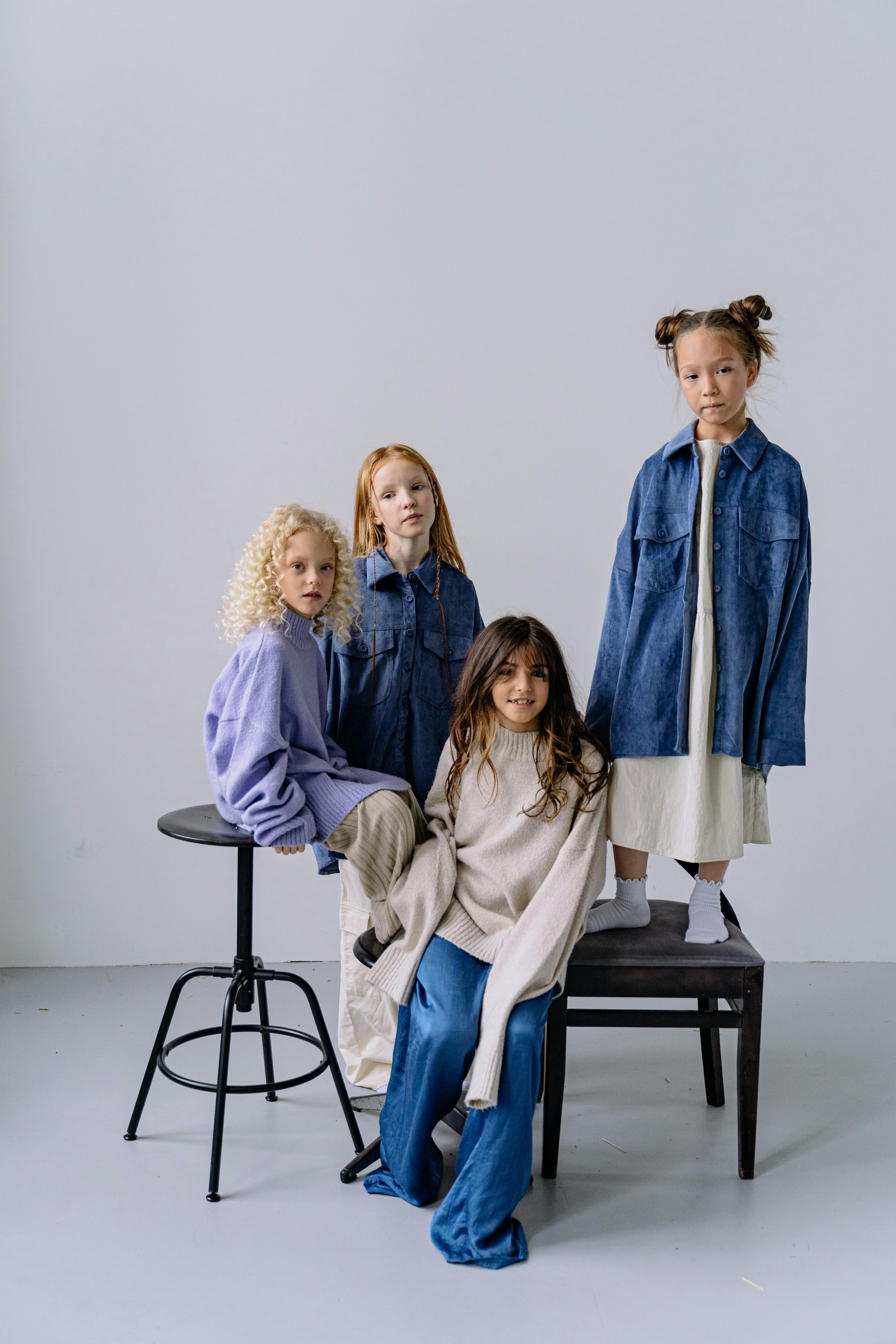 Child Model Posing on Stool · Free Stock Photo