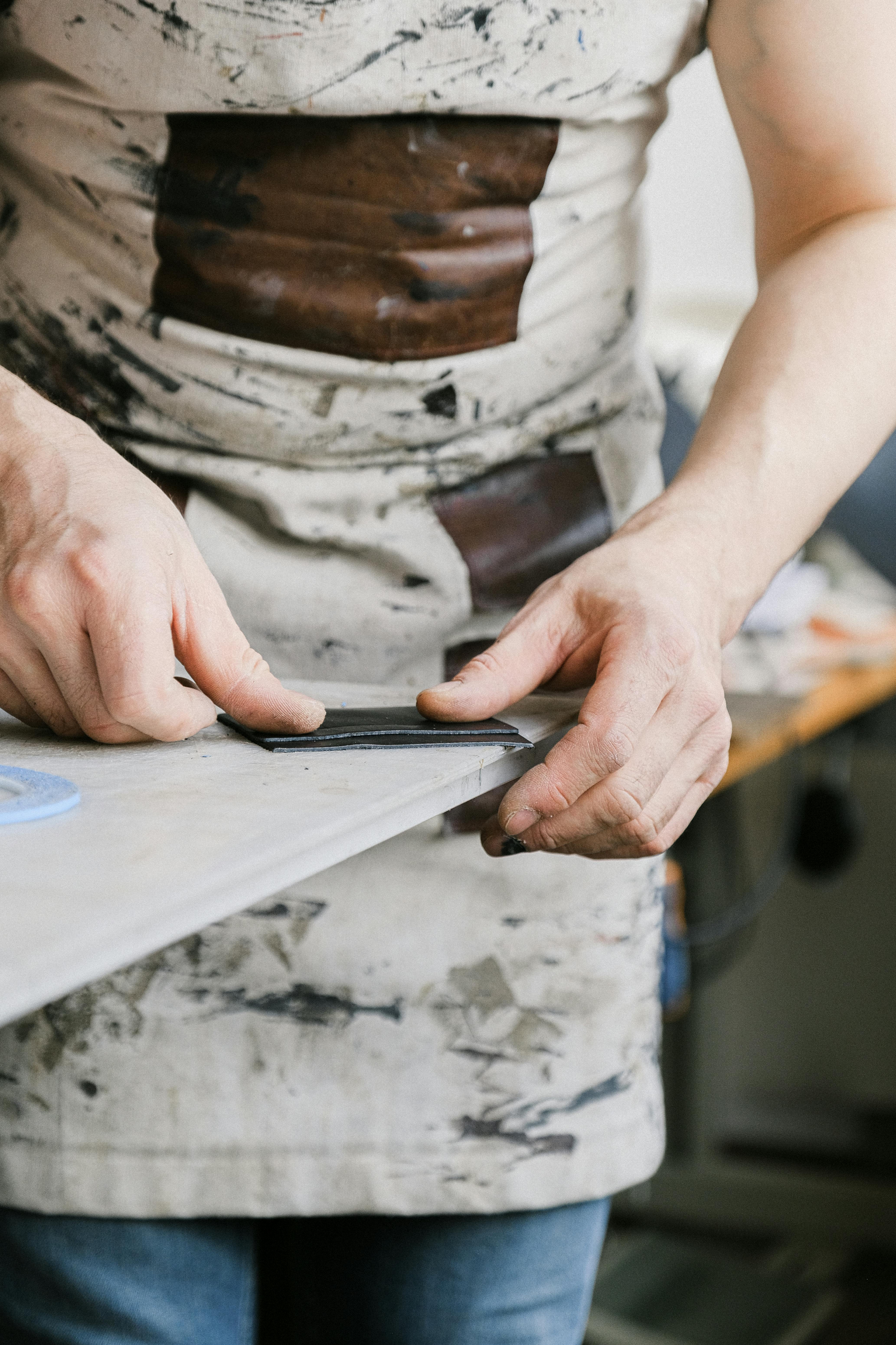Close-up of a Man Crafting a Product · Free Stock Photo
