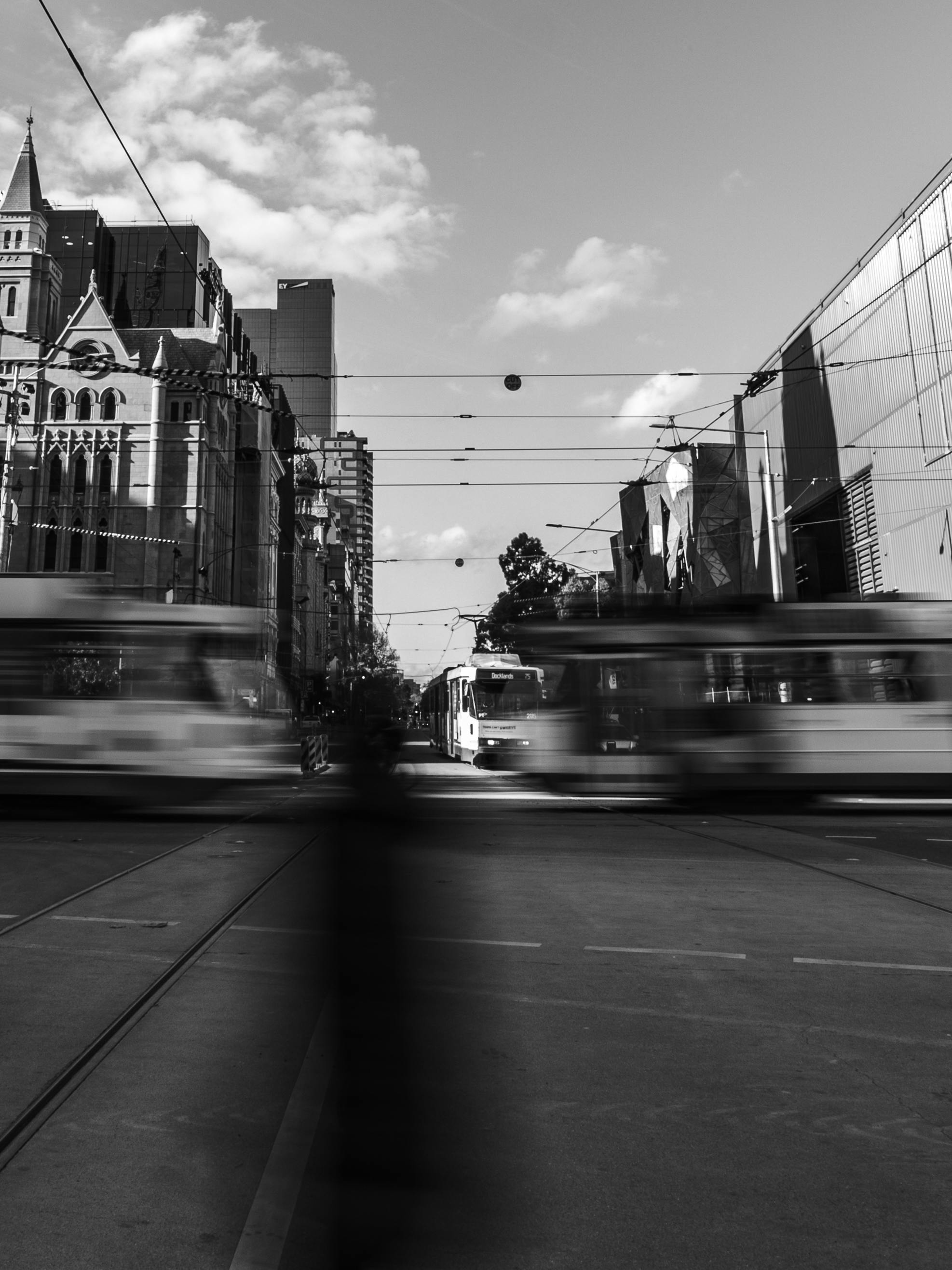 Grayscale Photo of Motor Vehicles Moving · Free Stock Photo