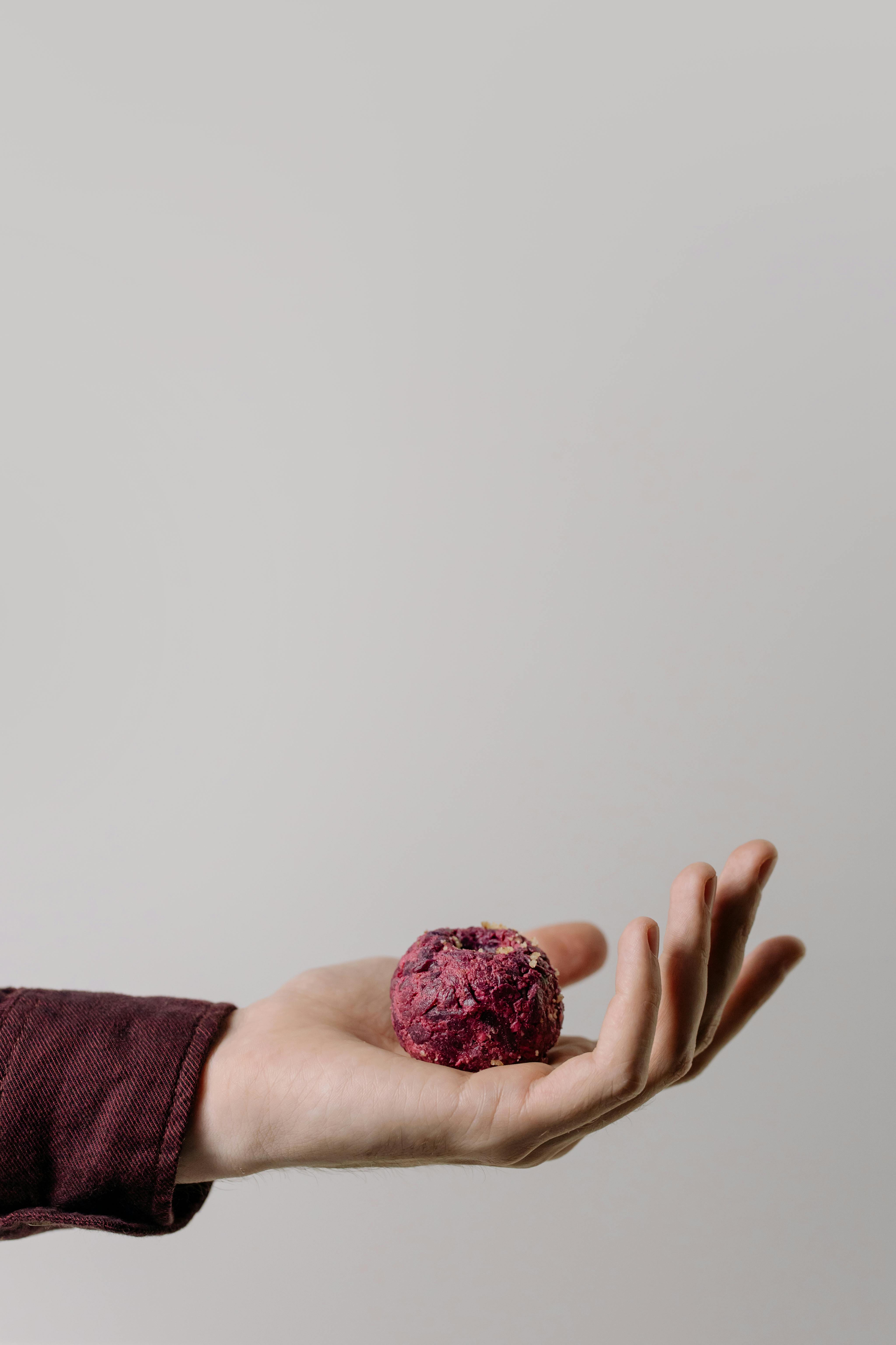 Person Holding Beetroot Pkhali · Free Stock Photo