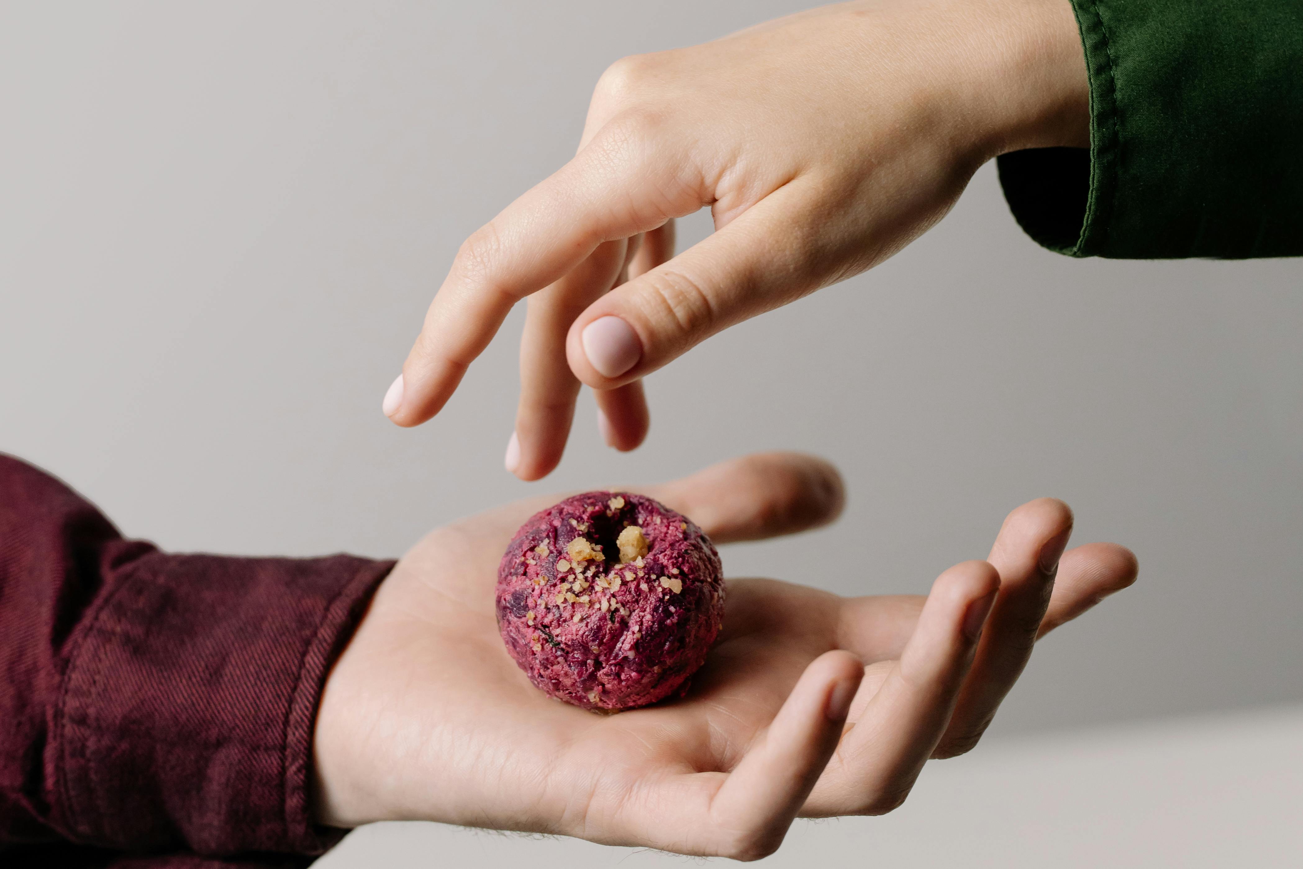 Person Holding Beetroot Pkhali · Free Stock Photo