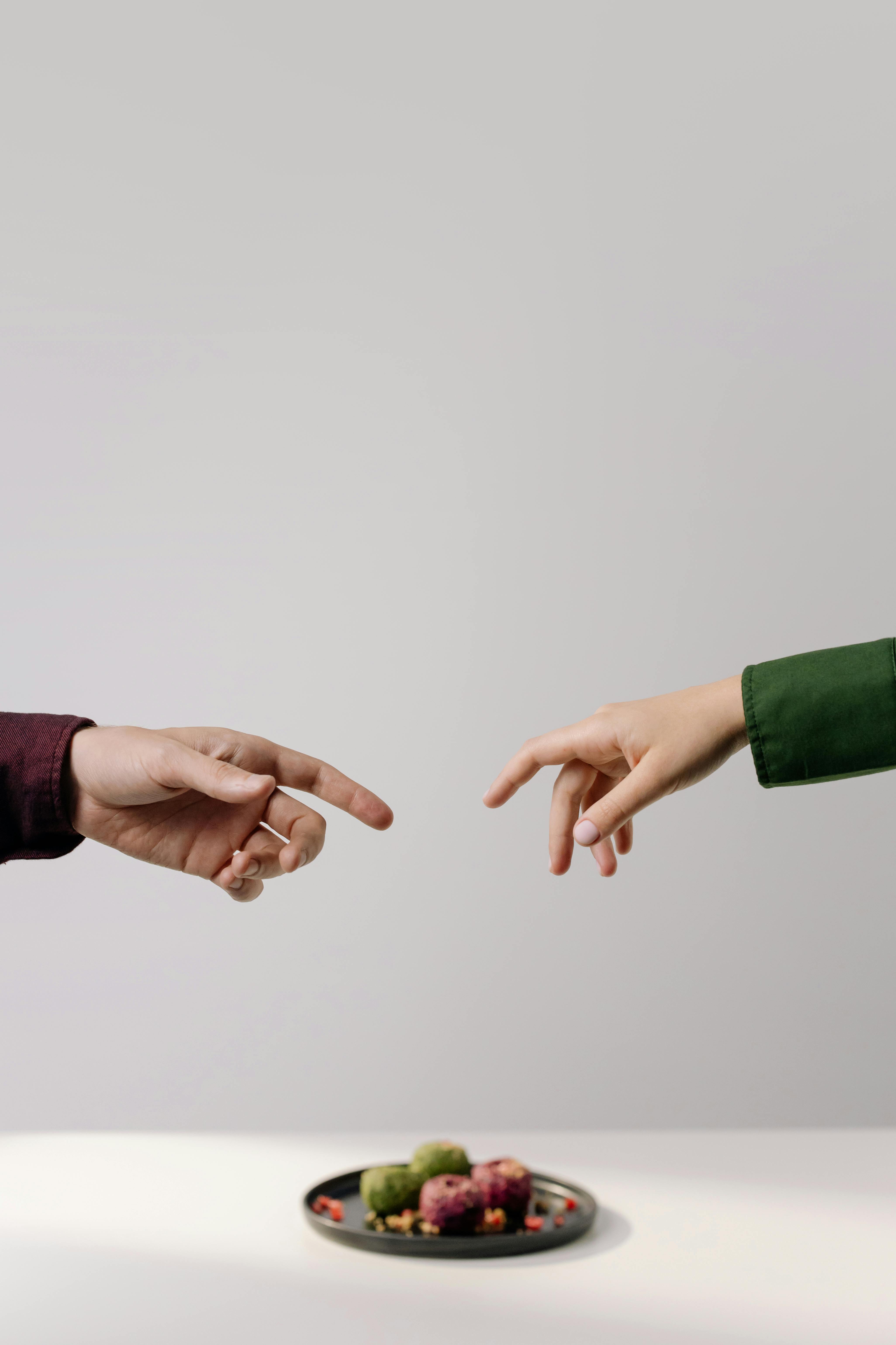 Hand Touching Reflection on Mirror · Free Stock Photo