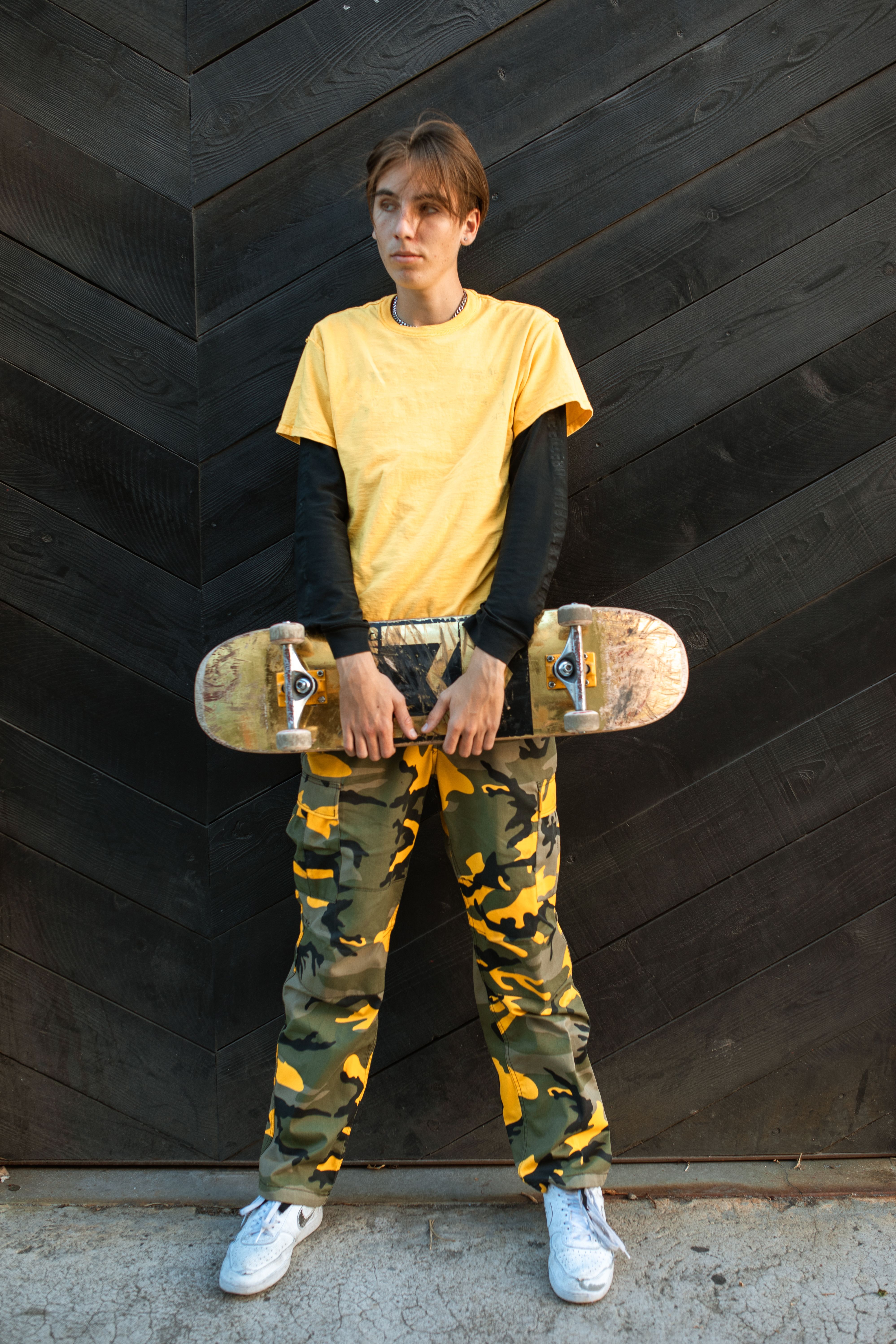 Person in Yellow Shirt Doing Skateboard Exhibition · Free Stock Photo