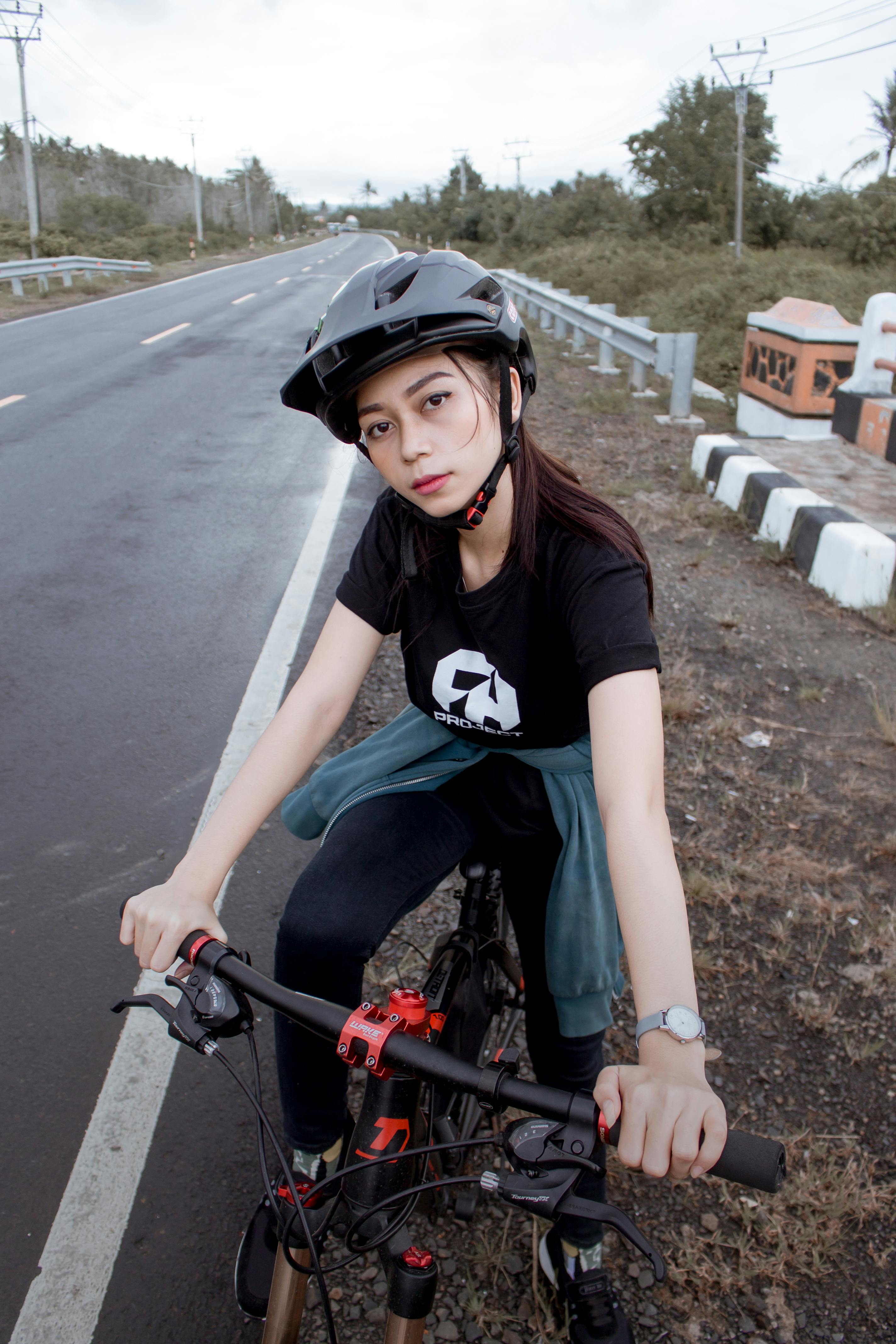 Woman Riding A Bike · Free Stock Photo