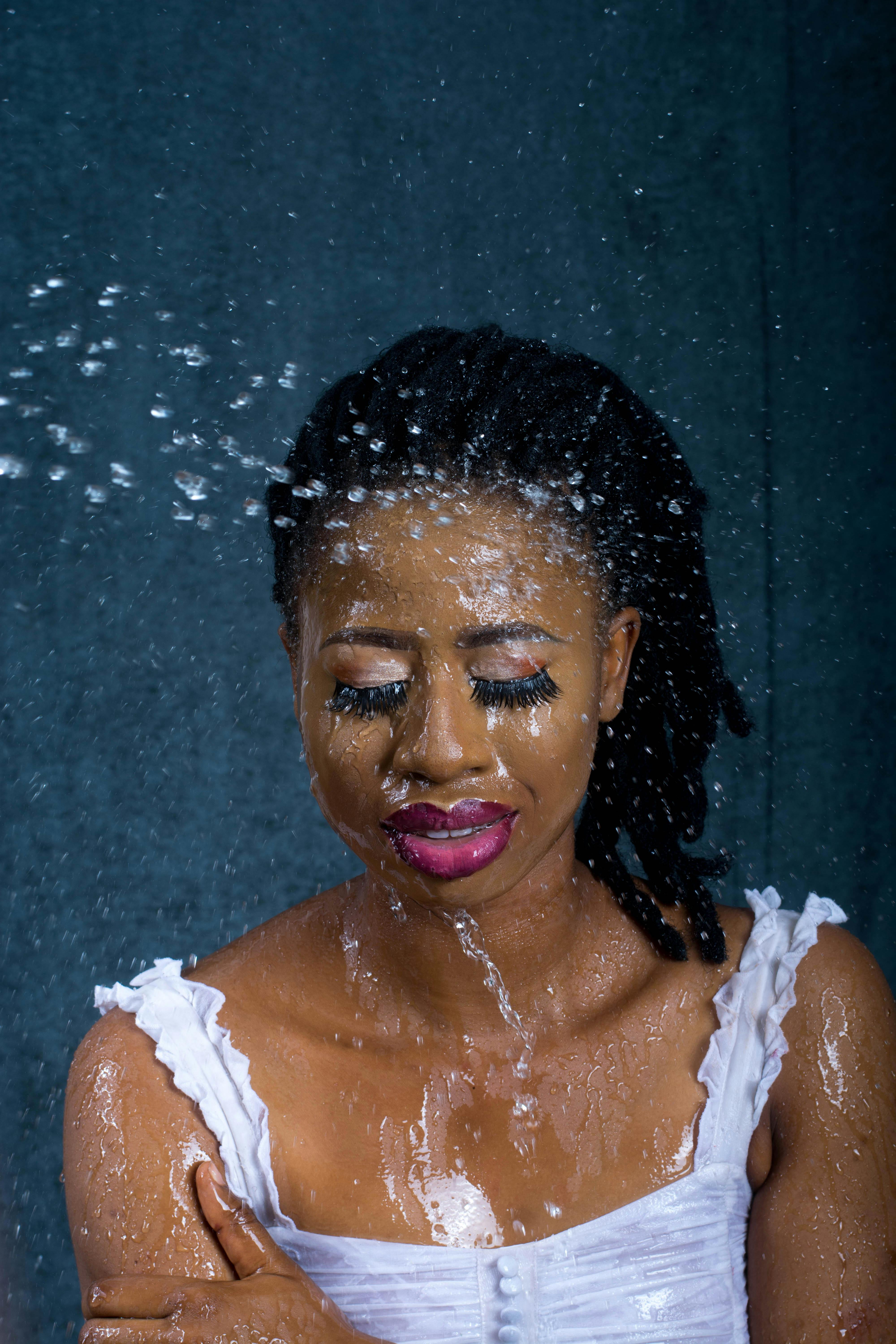 Water Splashing on a Woman · Free Stock Photo
