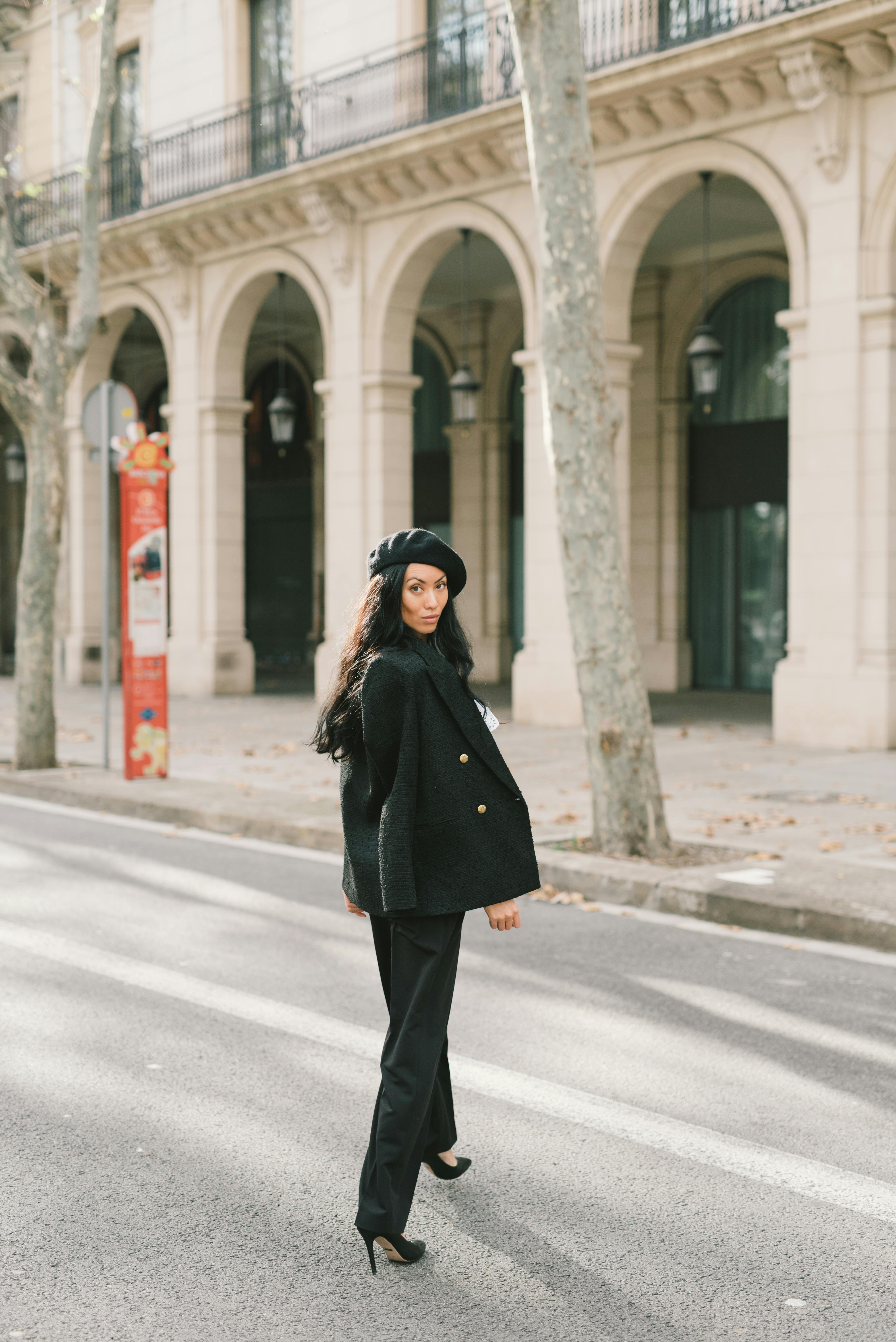 Woman in All Black Outfit Looking Back · Free Stock Photo