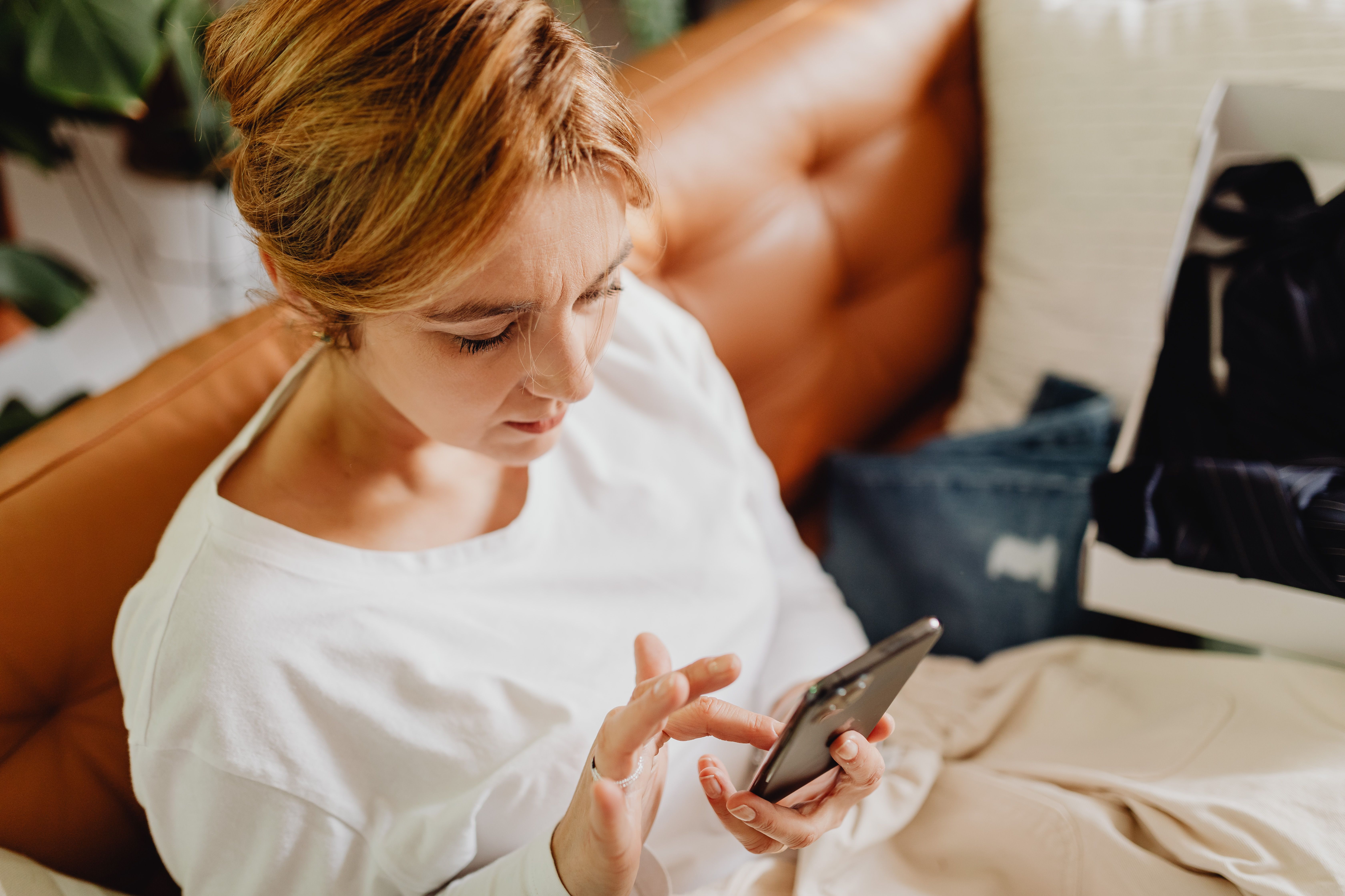 A Woman using a Smartphone · Free Stock Photo