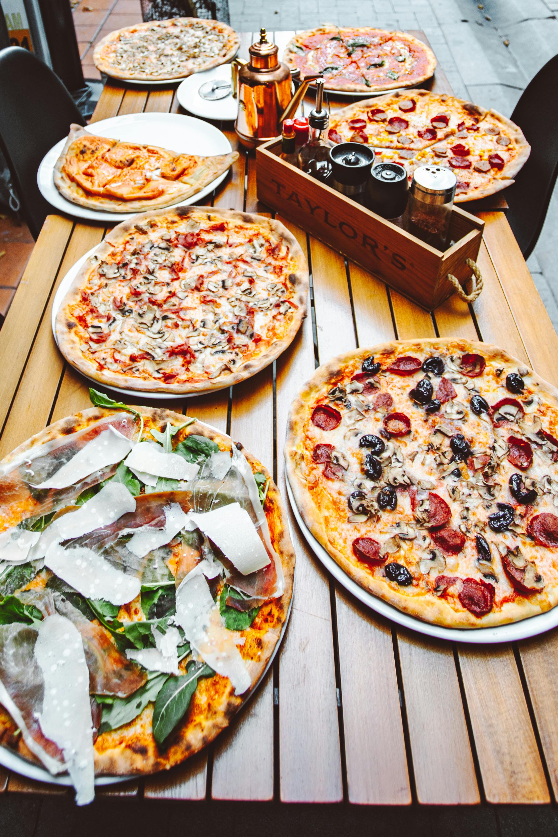 Pizzas on a Table · Free Stock Photo