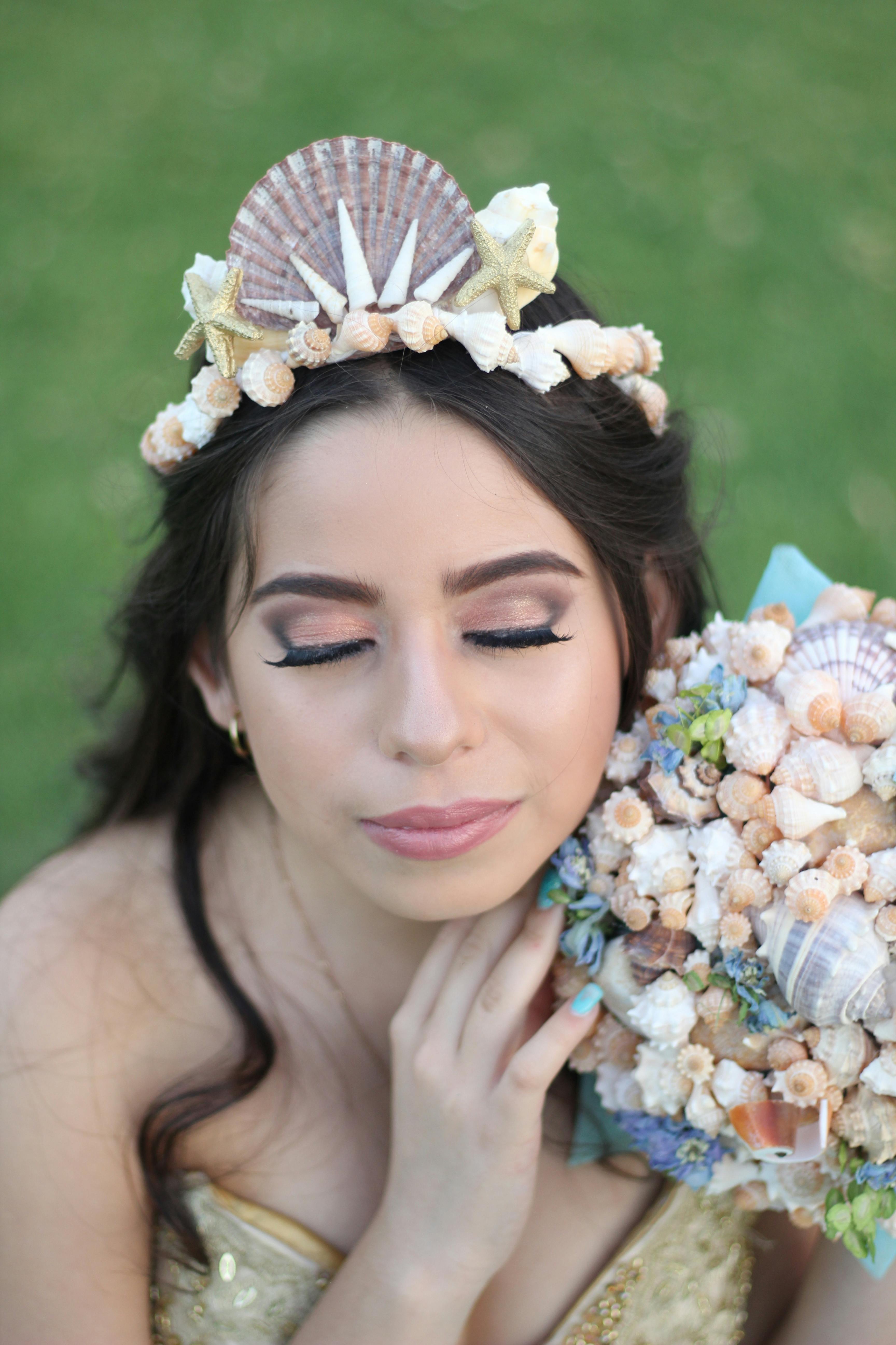 Portrait of a Woman with Seashells · Free Stock Photo