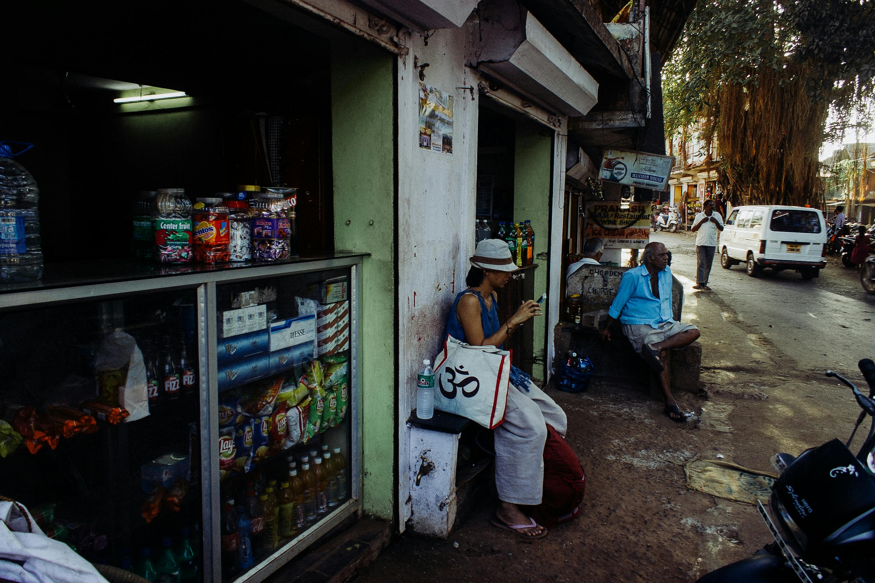 Asian people on street in poor city district · Free Stock Photo
