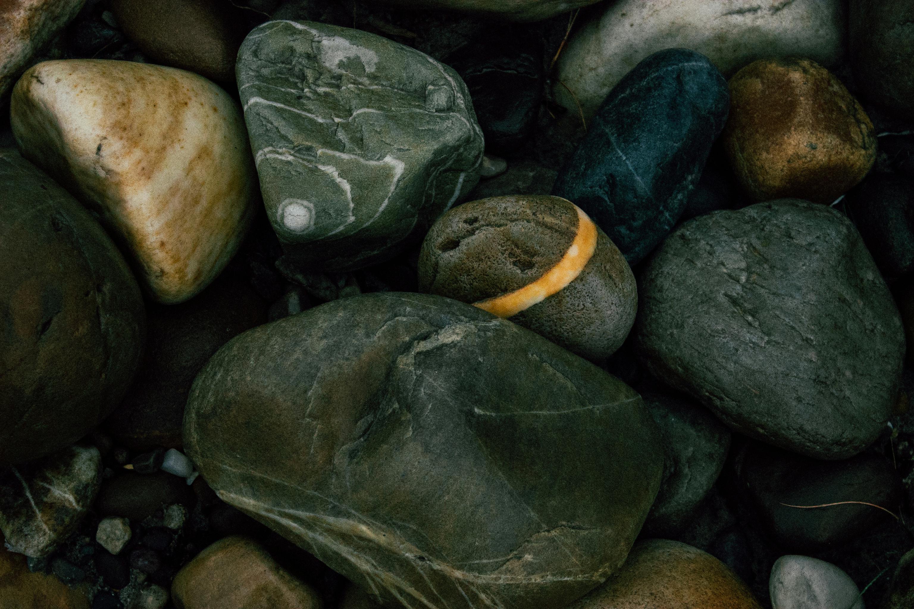 Various of stones placed on beach · Free Stock Photo