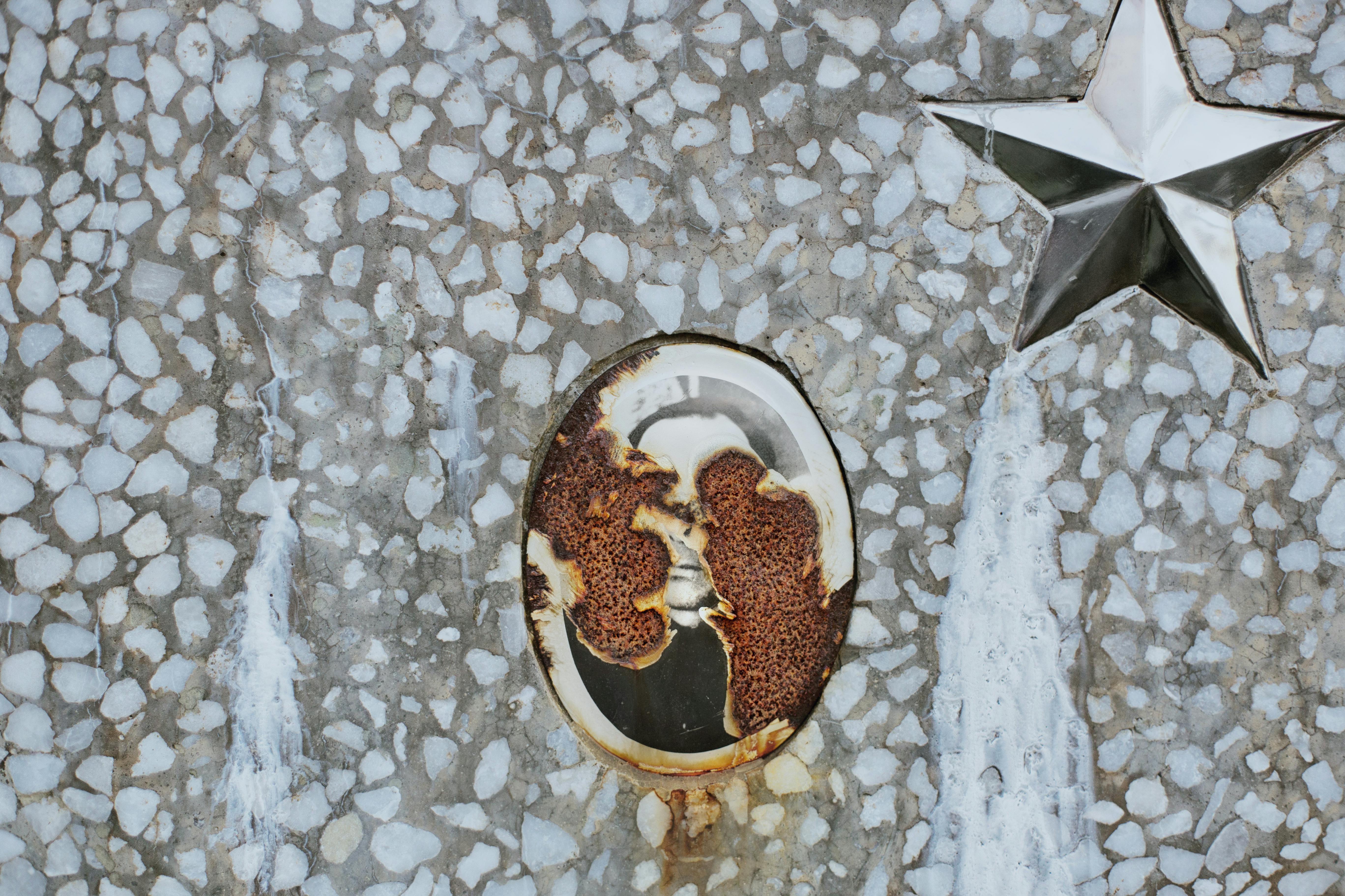 Rusty memorial picture on gravestone at cemetery · Free Stock Photo