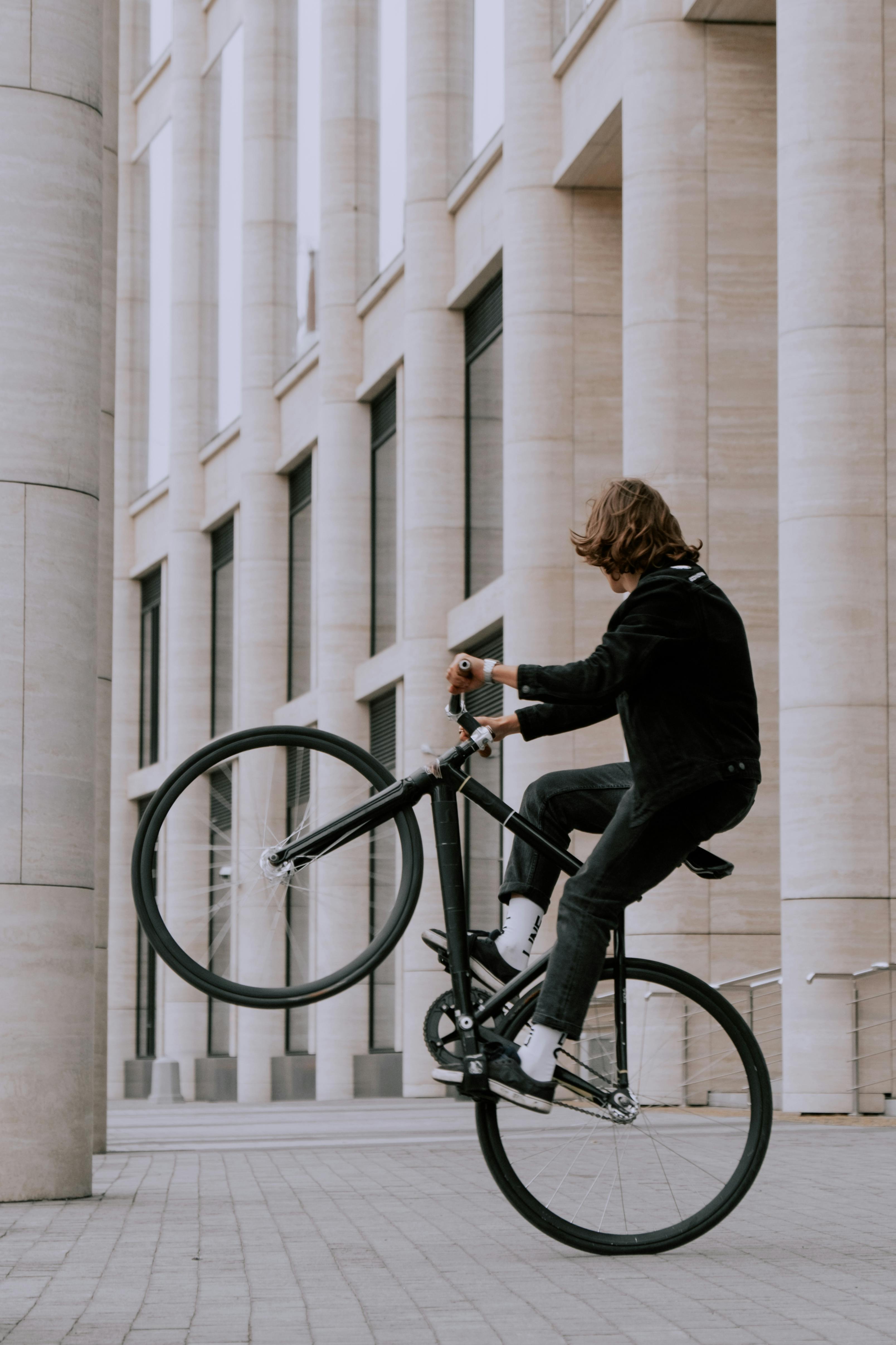 A Person Riding Bicycle Upside Down · Free Stock Photo