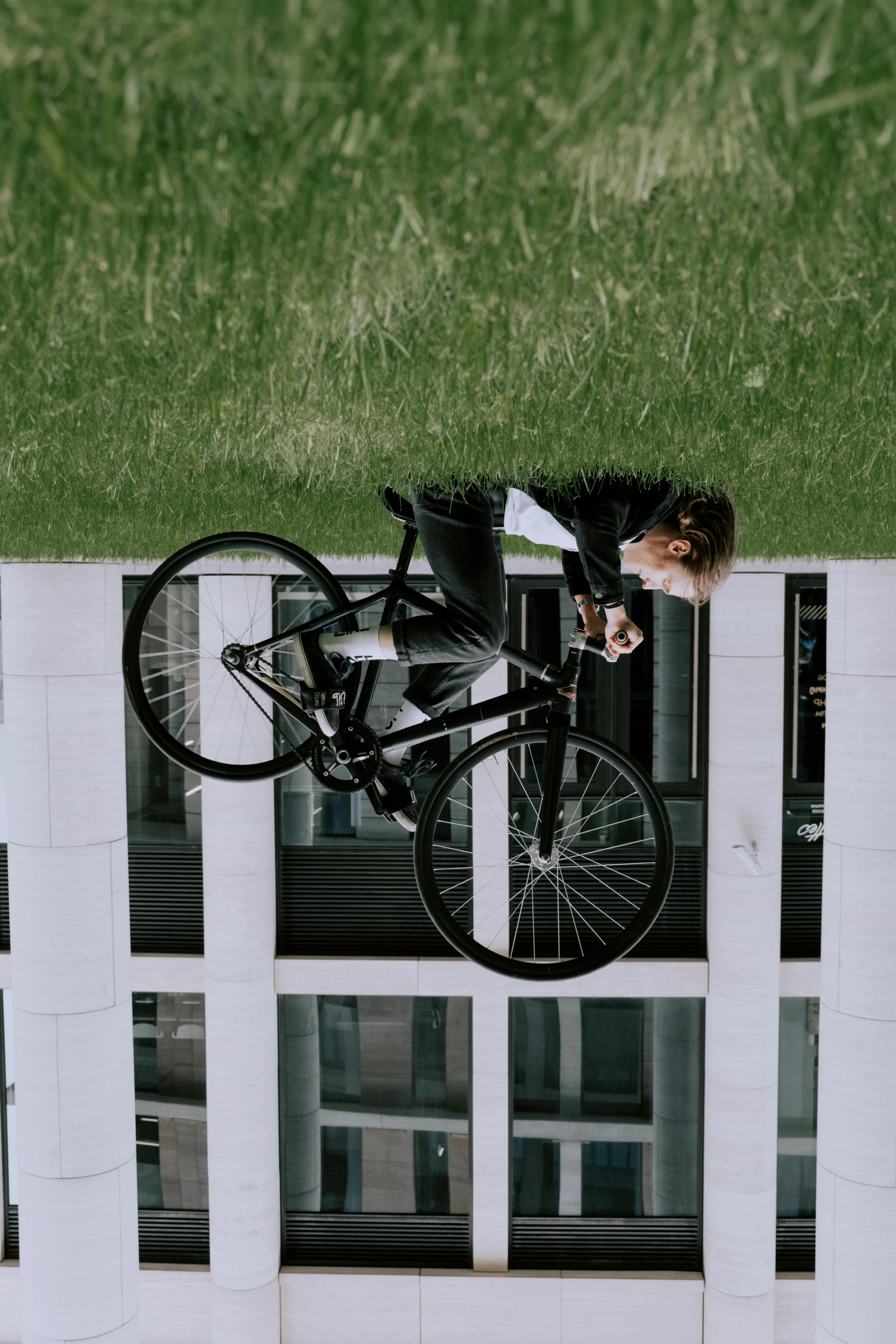 Man Riding Bicycle Upside Down · Free Stock Photo