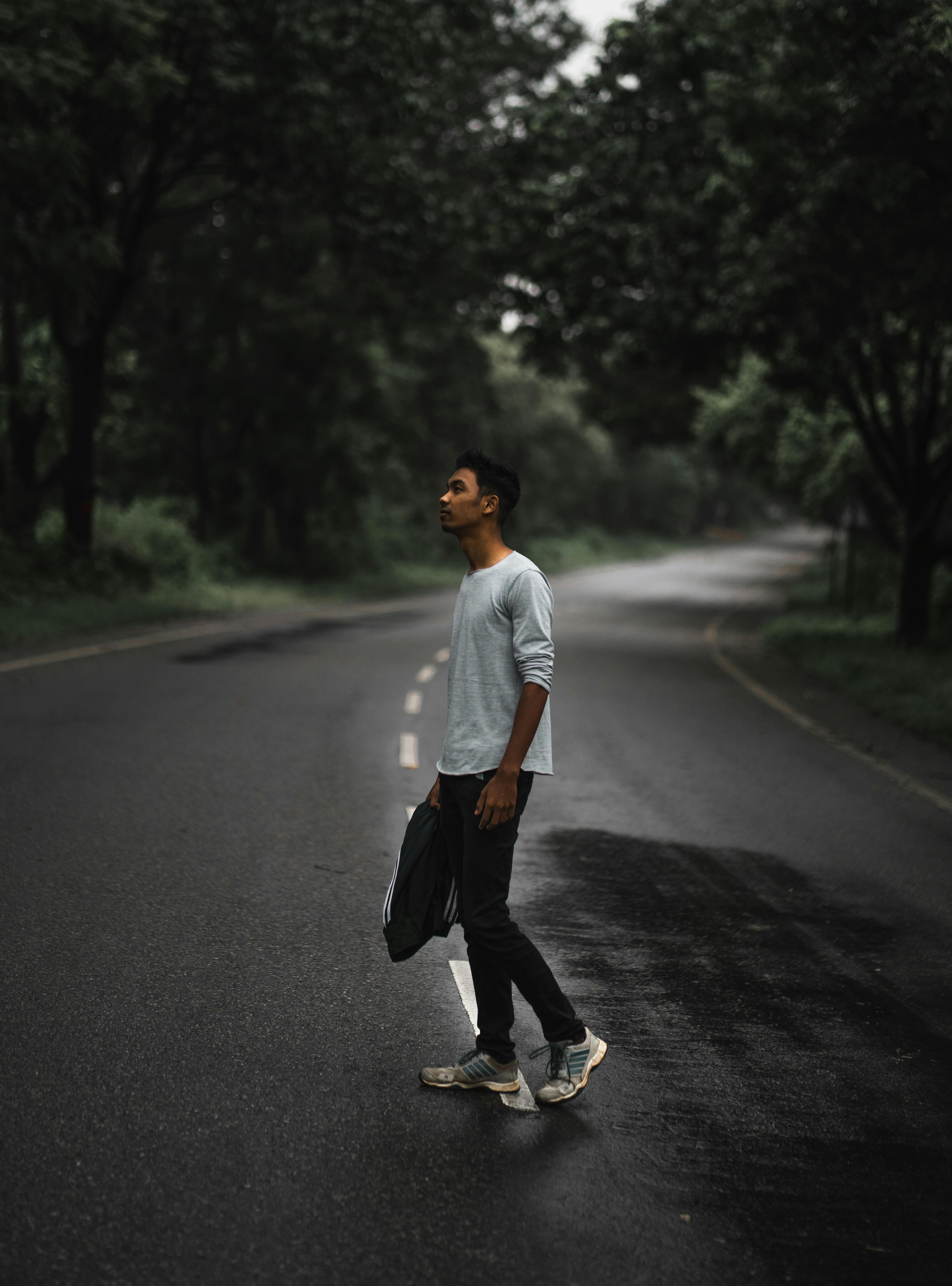 A Man Standing on the Road · Free Stock Photo