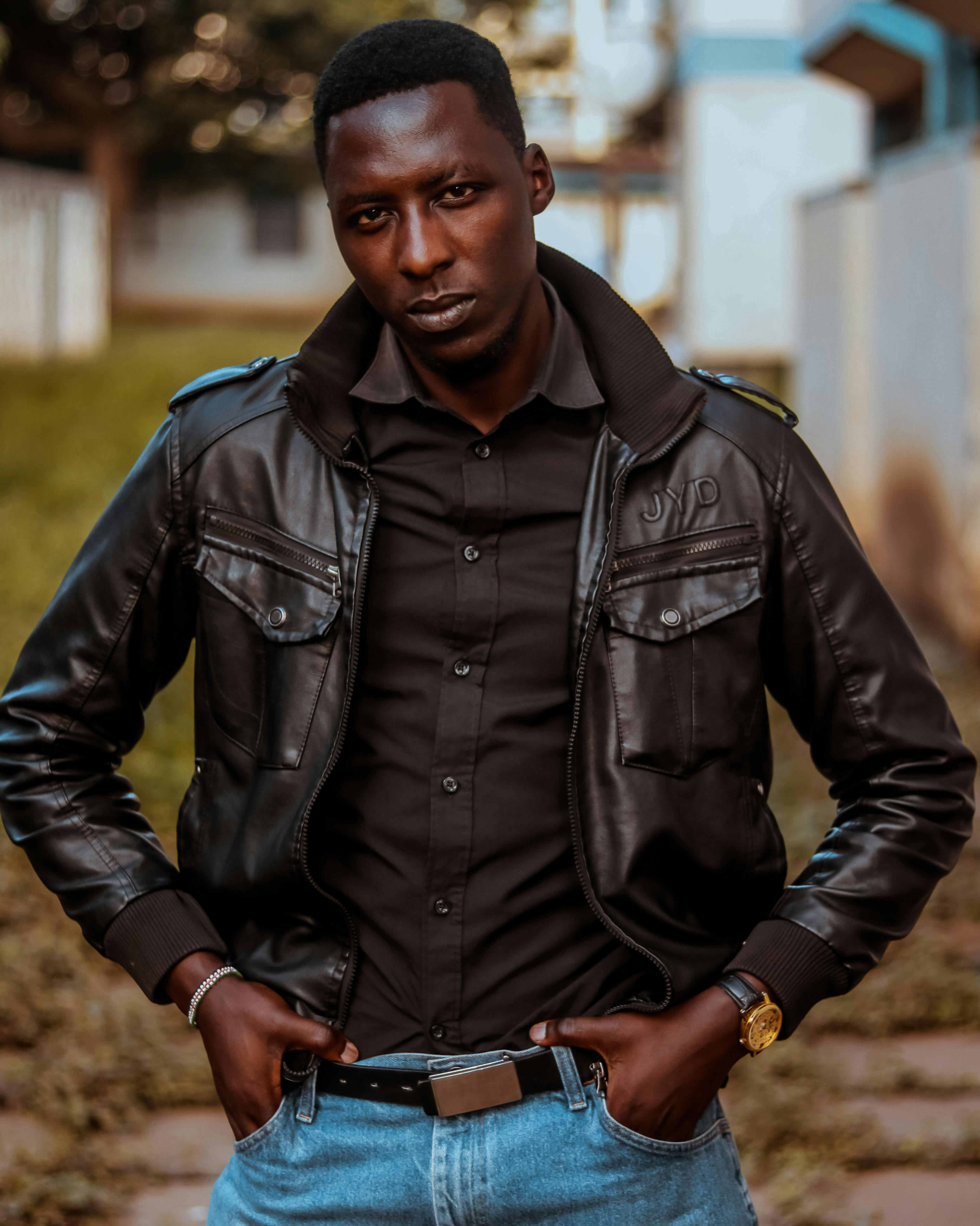 Man in Black Leather Biker Jacket with Script on Back · Free Stock Photo