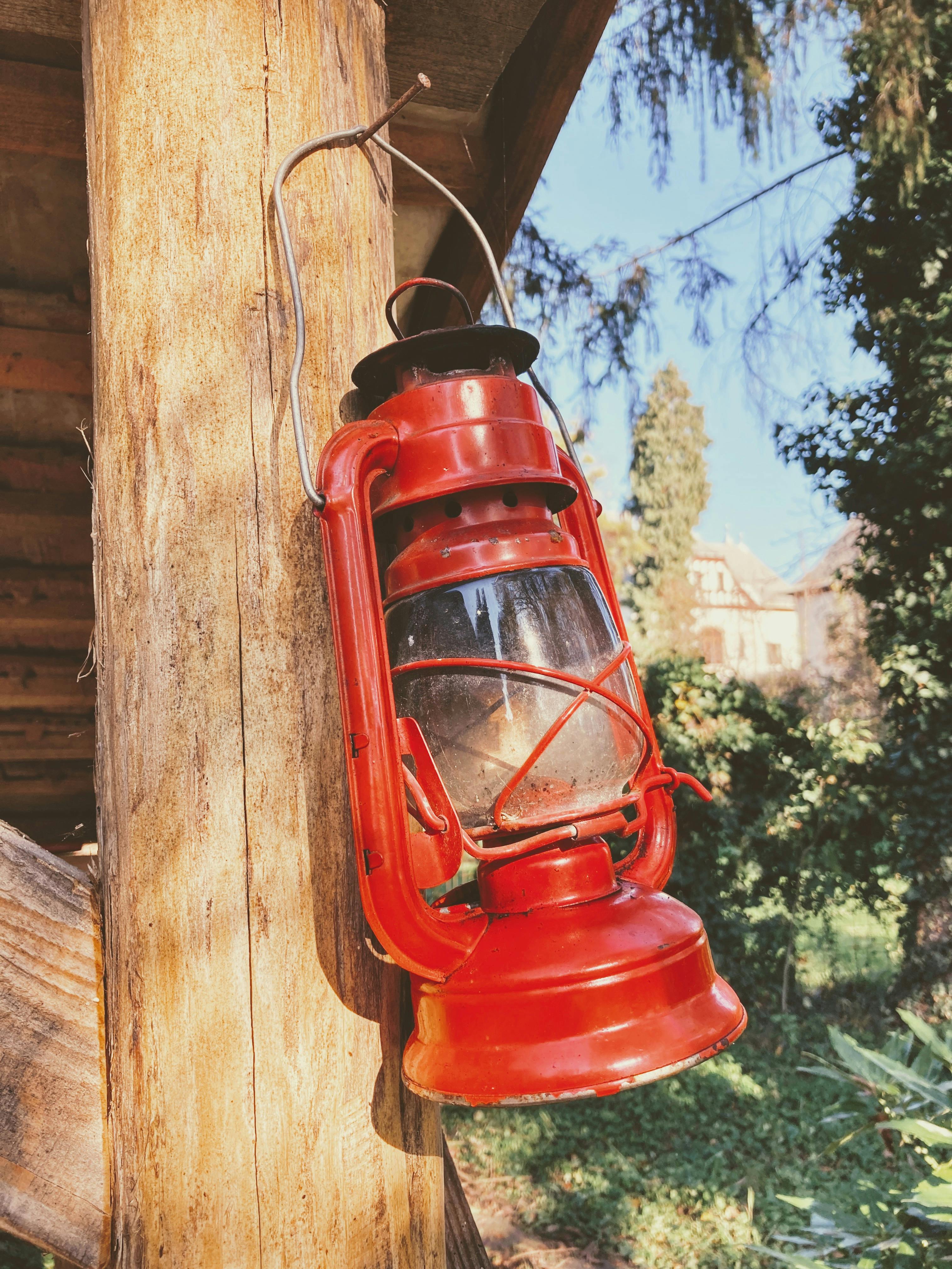 Close-up of Lantern Hanging on Wooden Beam · Free Stock Photo