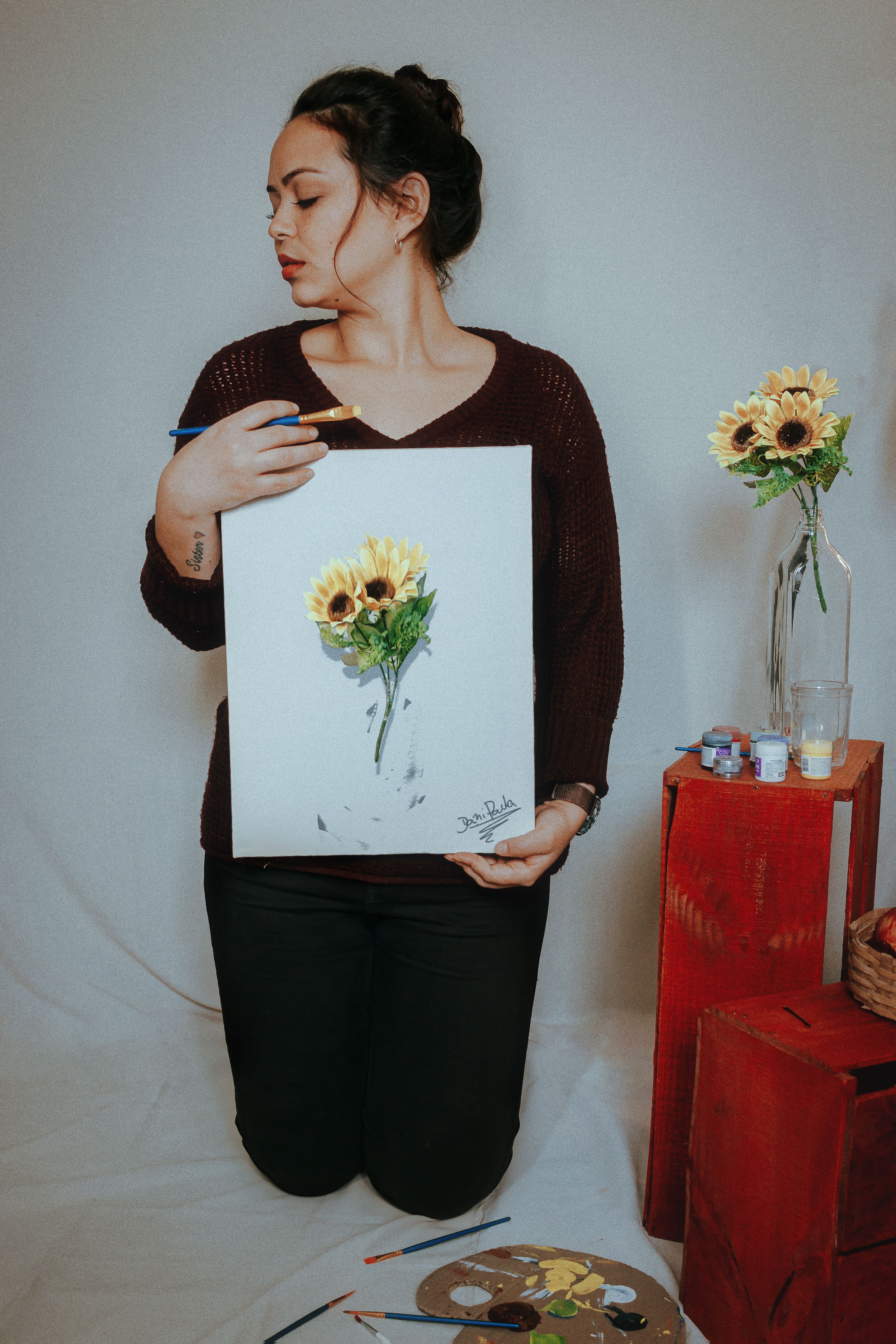 A Woman Holding Her Painting · Free Stock Photo